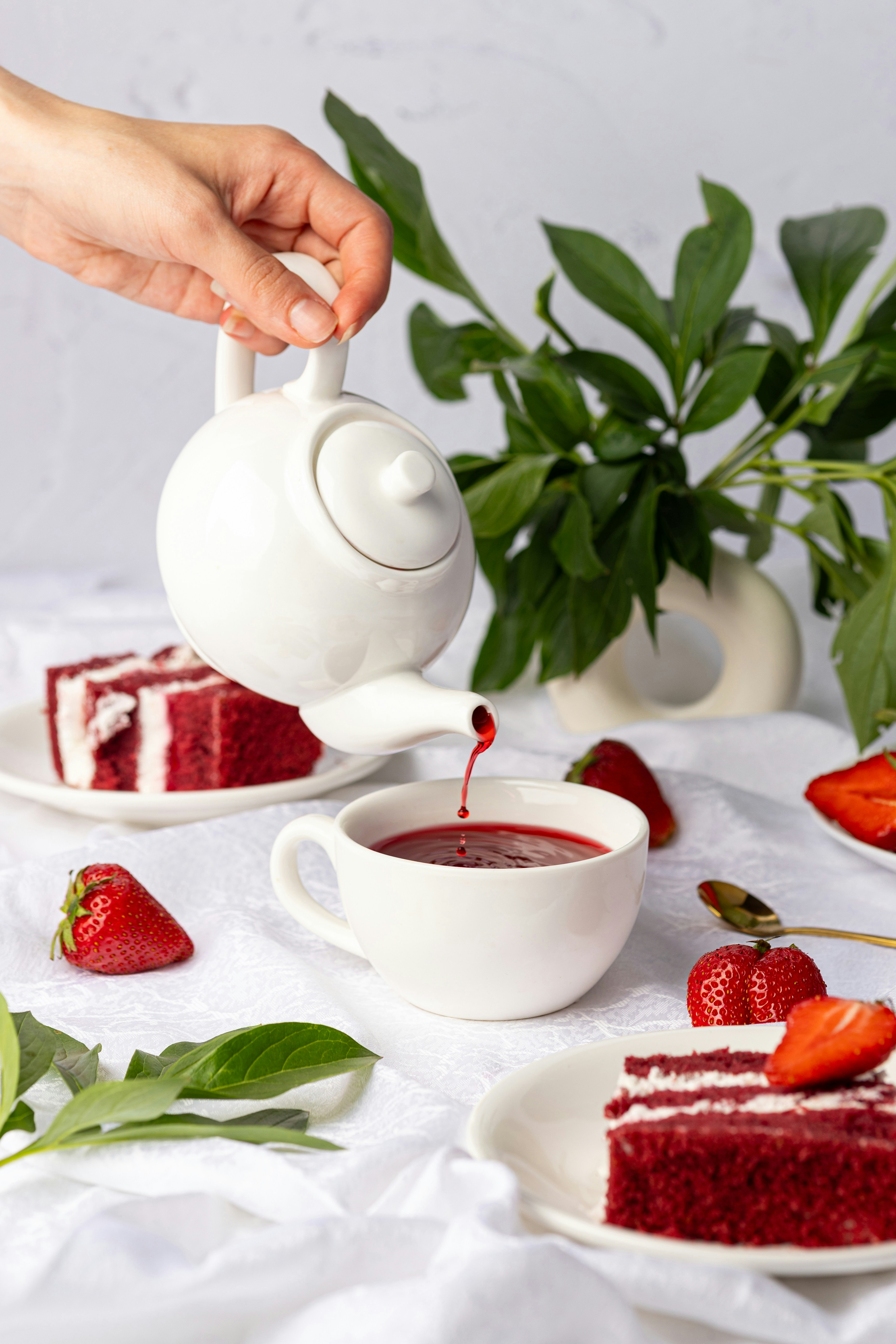 Red Tea Cascade: Pouring Ruby into White Harmony