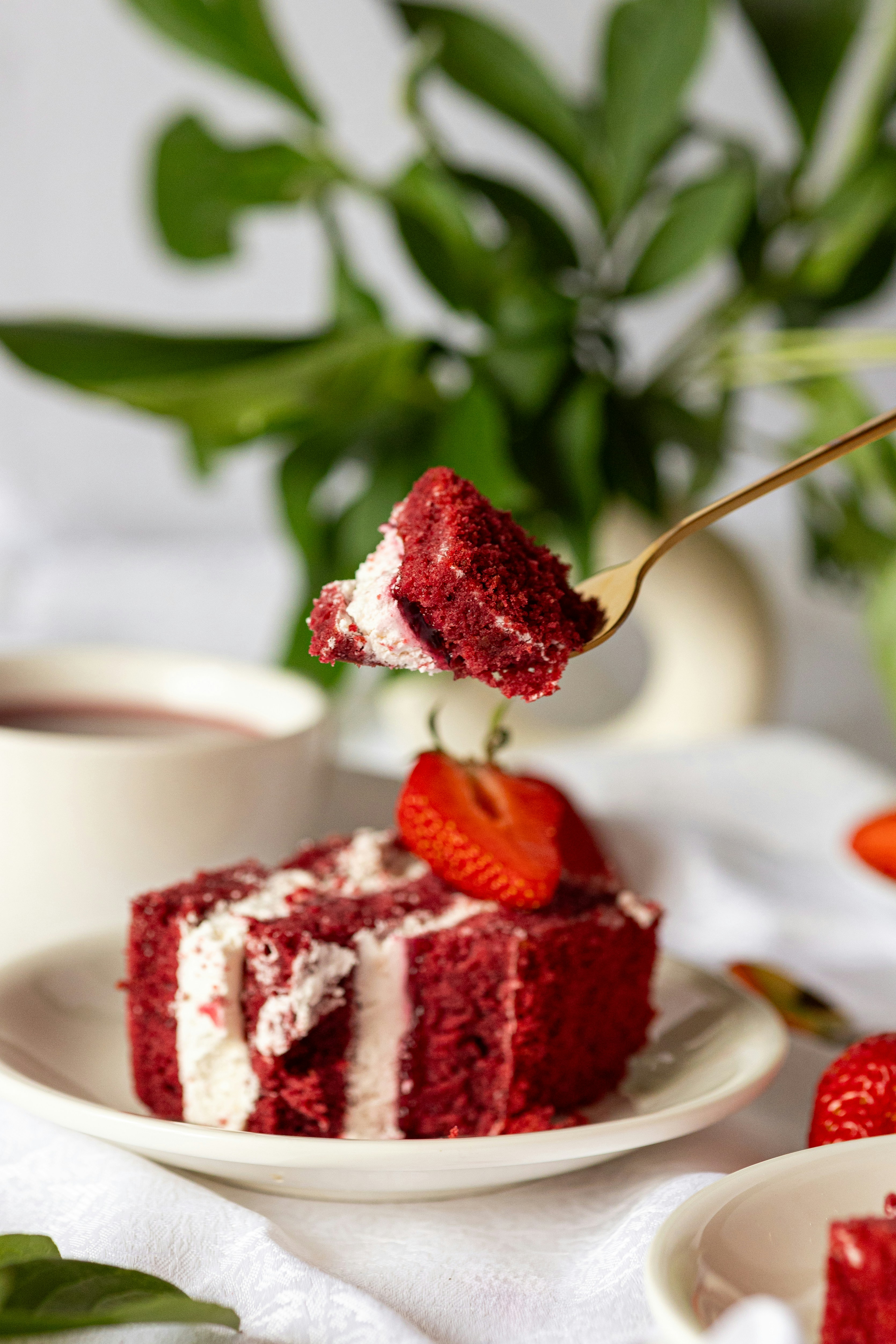 Velvet Slice: Red Velvet Cake with Creamy Stripe and Fresh Strawberry