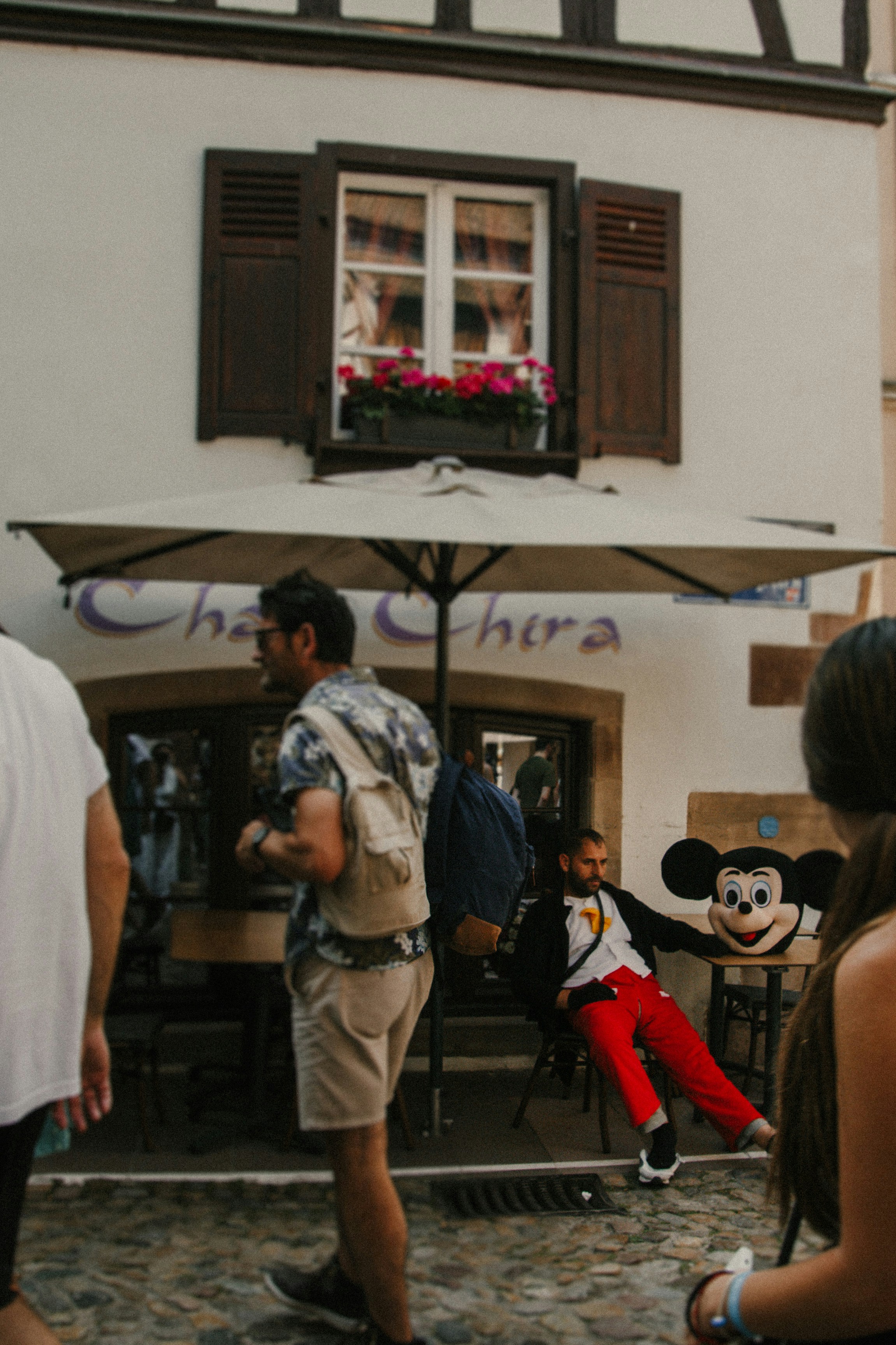 Cafe Courtyard Portrait with Mickey Under the Umbrella