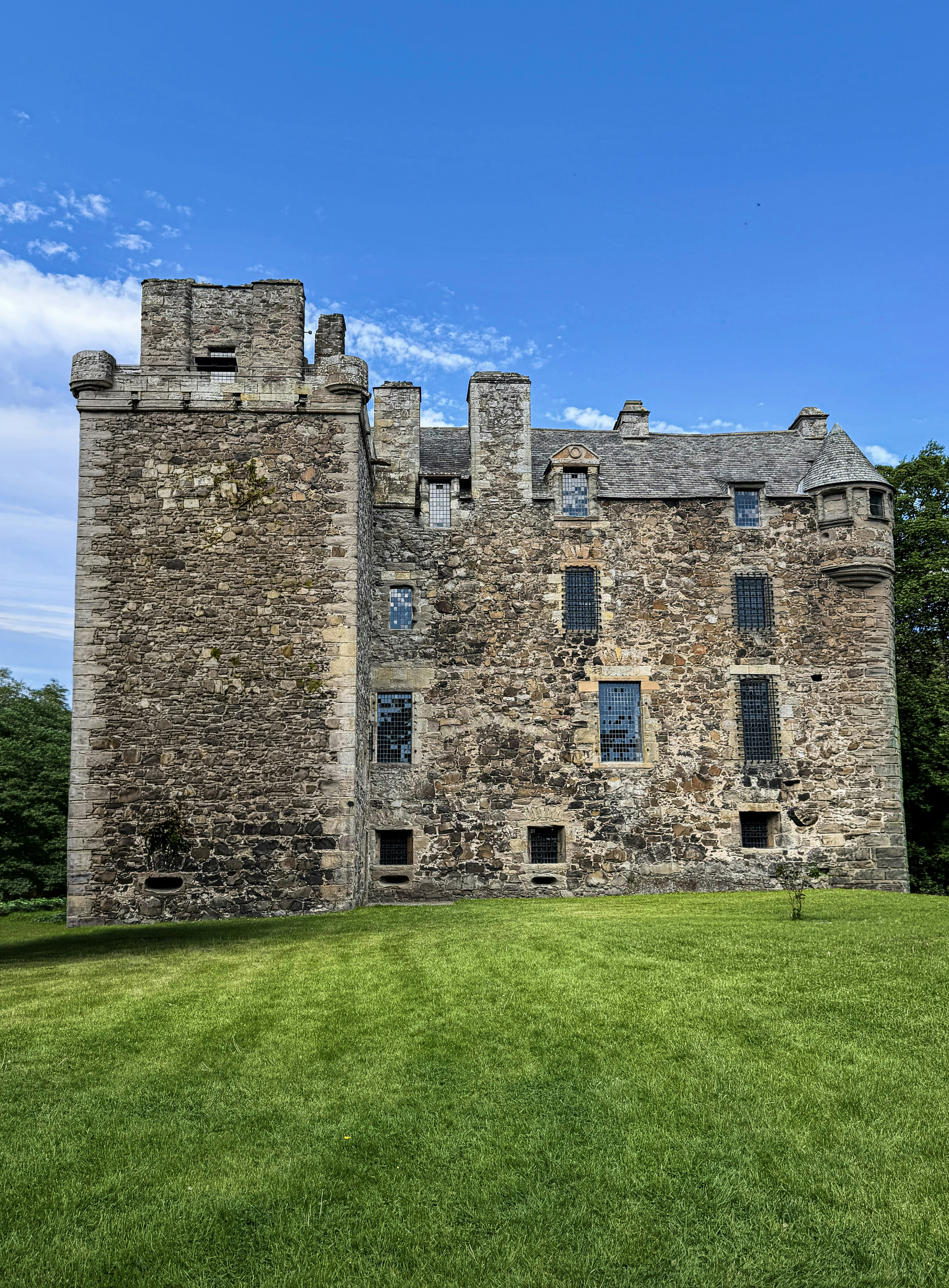 Medieval Sentinel: Stones, Tower, and a Sweep of Green