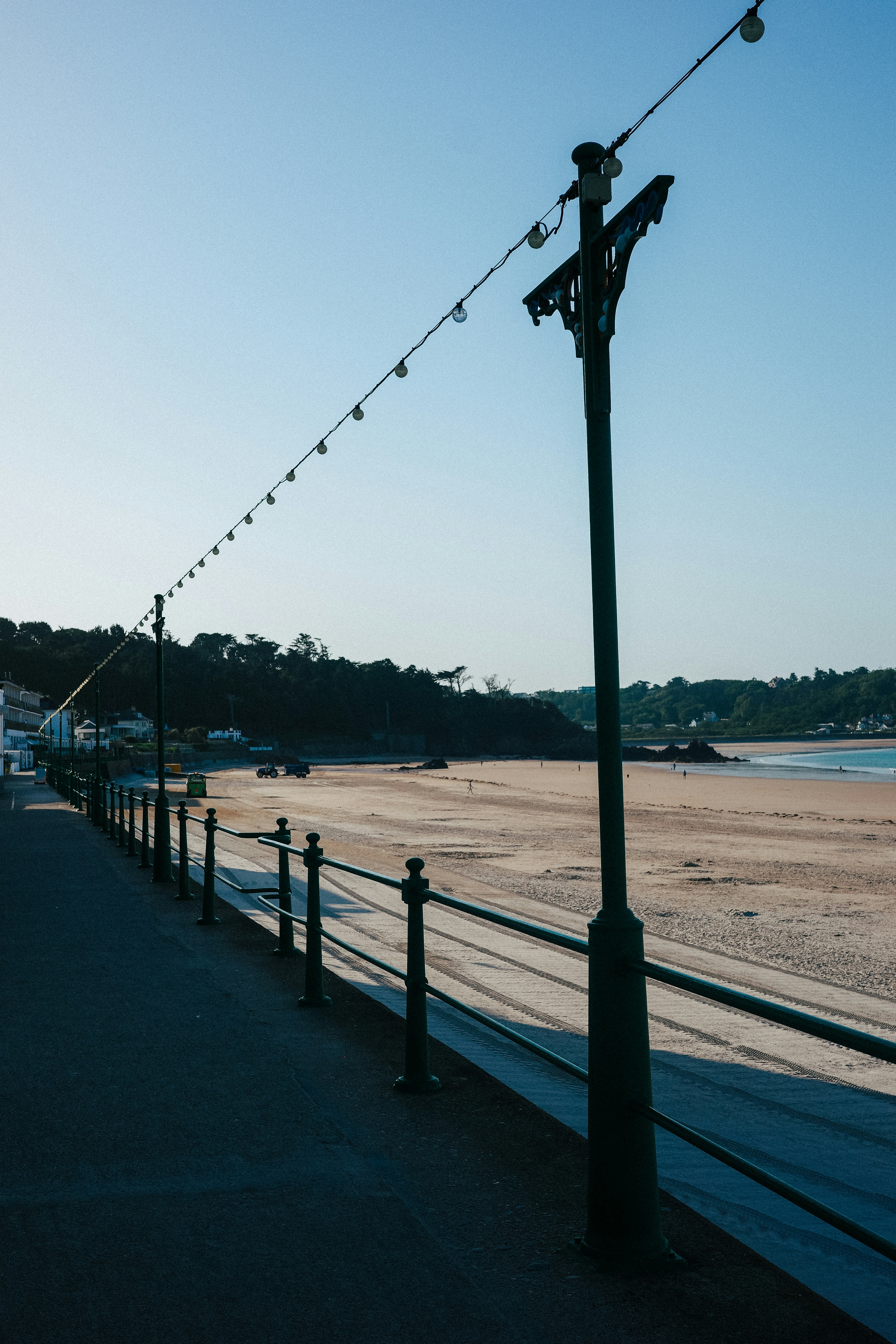 Lining the Sea Path: A Quiet Evening Along the Pier