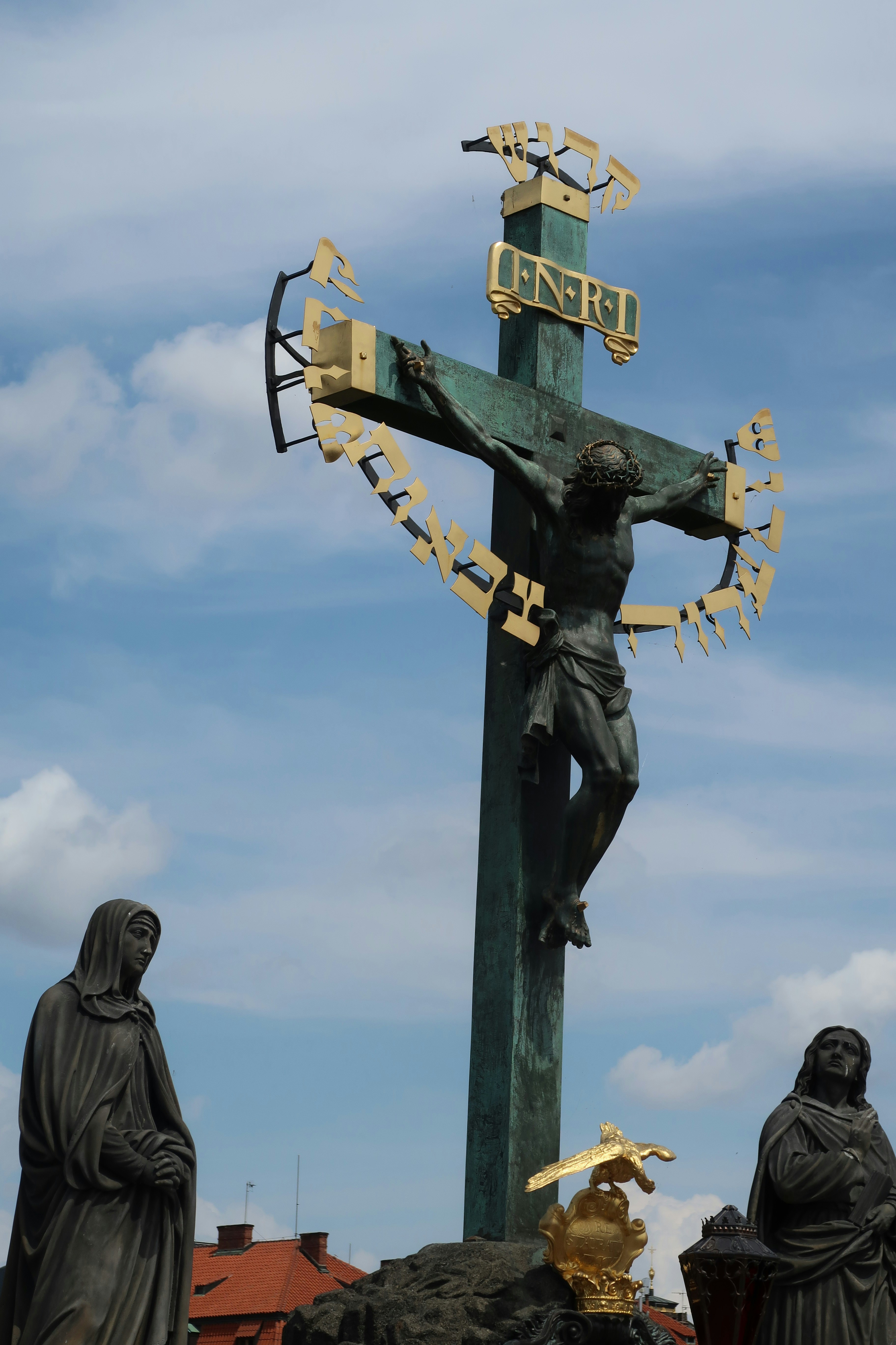 Crucifixion Sculpture Under a Blue Sky