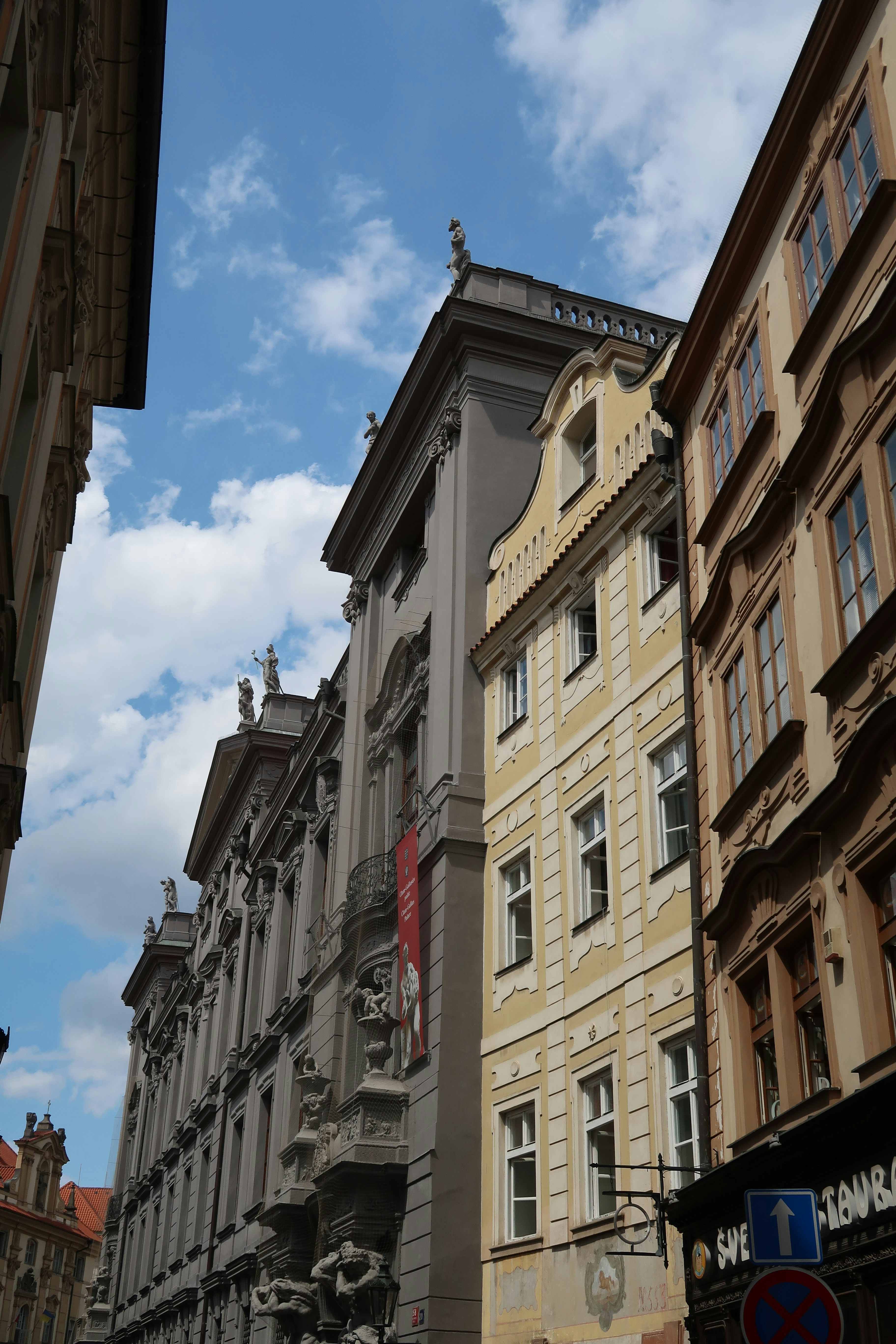 A Street of Heritage Facades Nestled Toward a Bright Sky