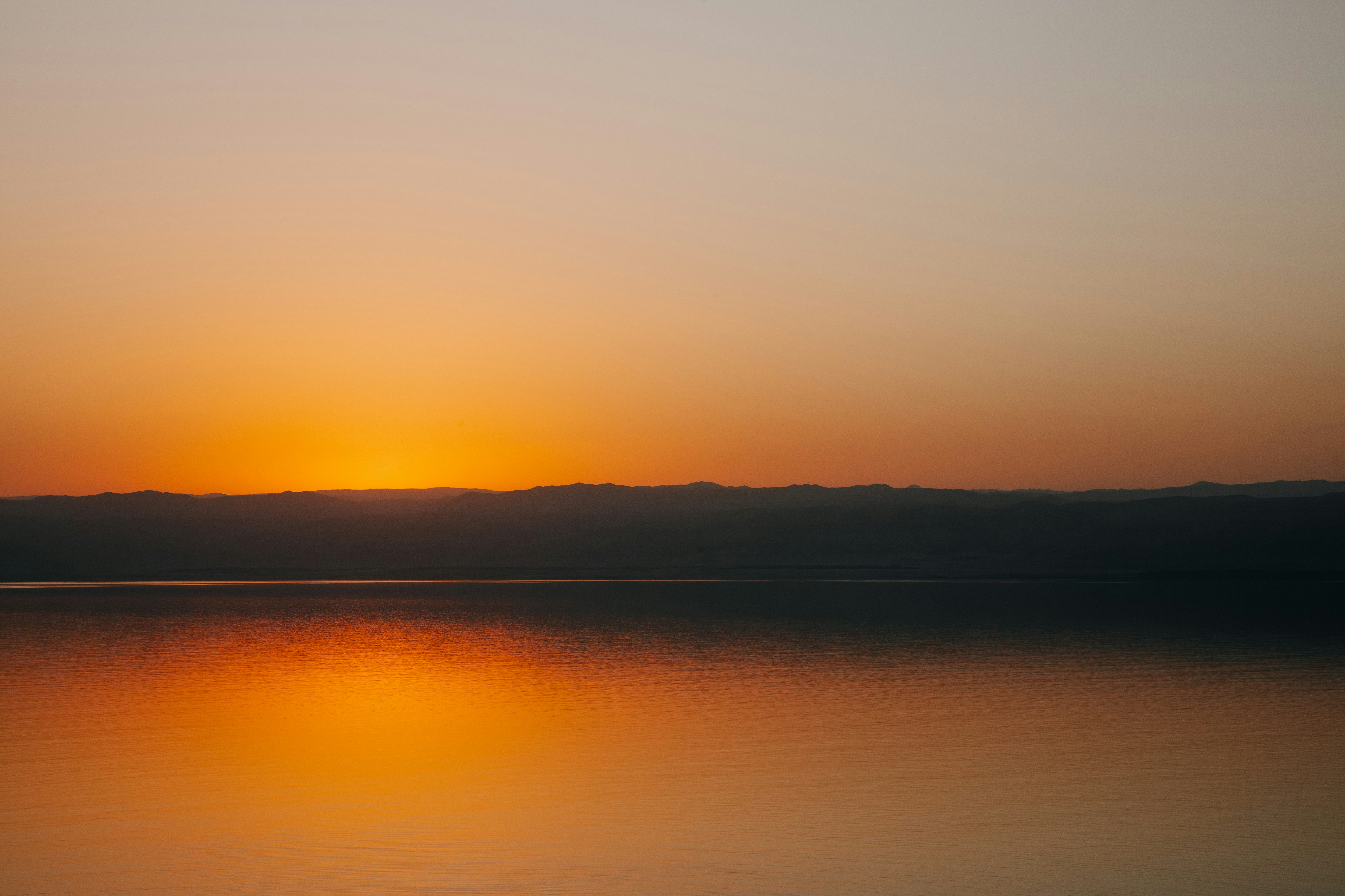 Velvet Horizon: Sunlit Quiet Across a Lake