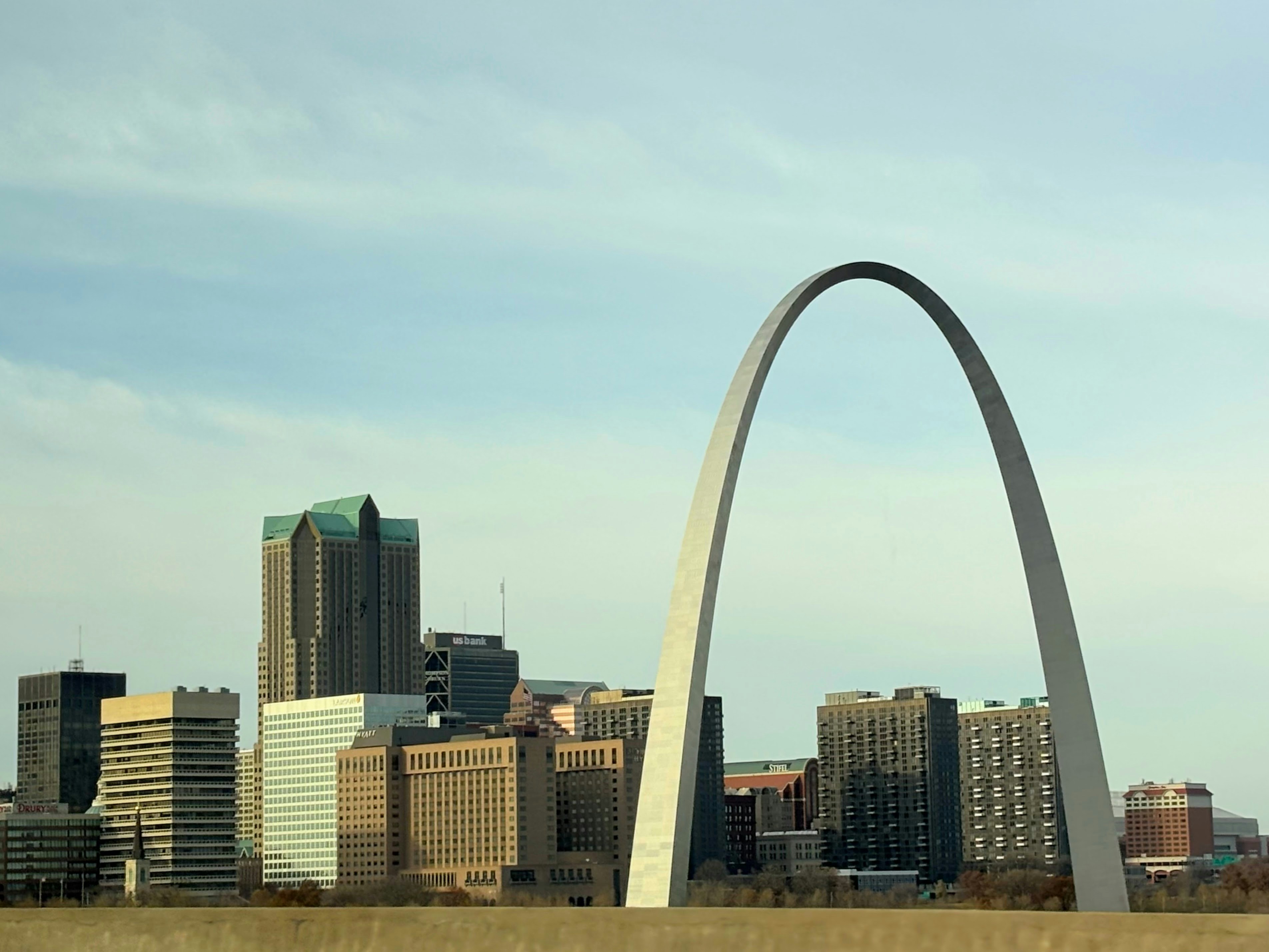 Gateway Arch with Downtown Silhouette at Dusk