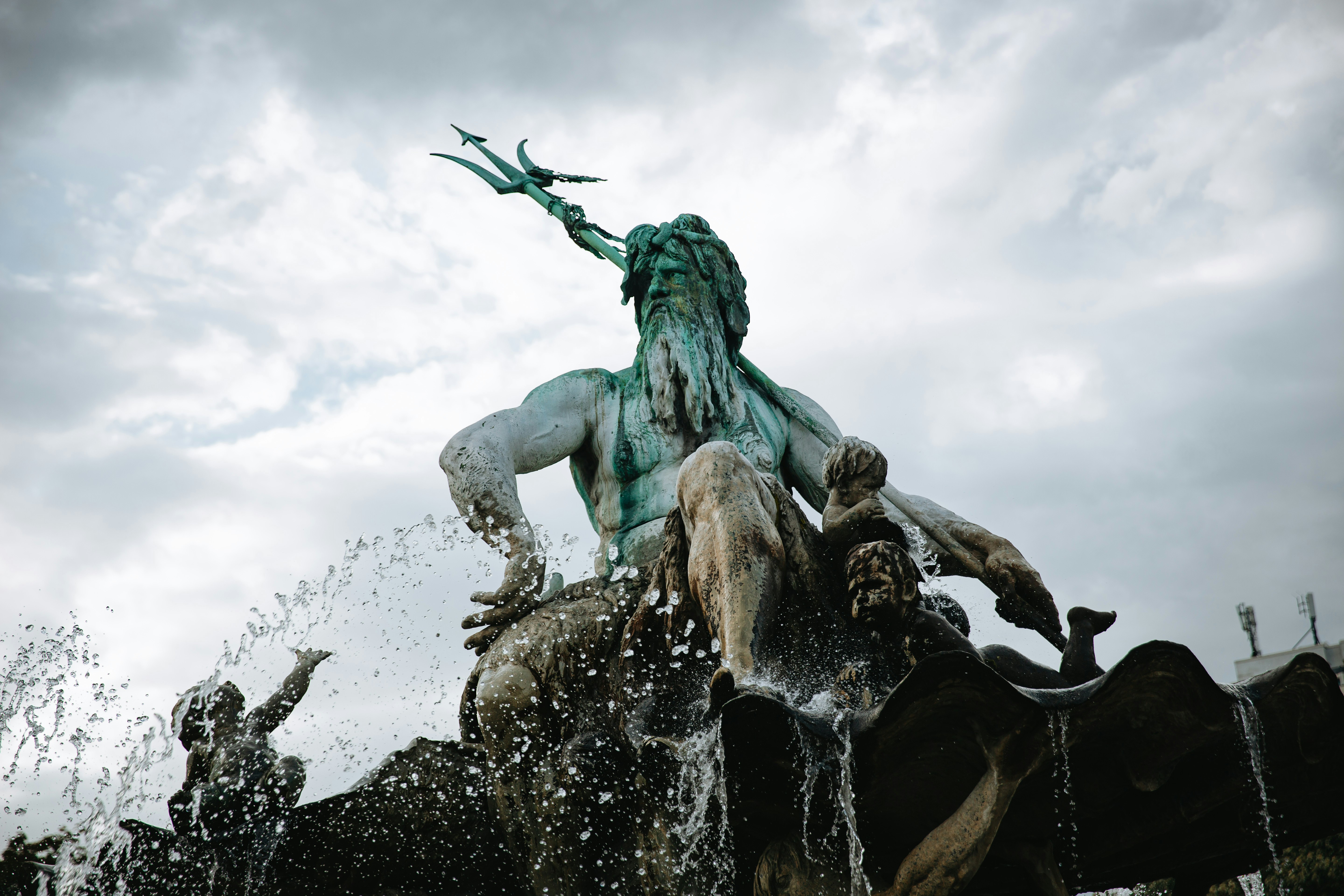 Giant of the Fountain: A Weathered Titan Reaching for the Sky