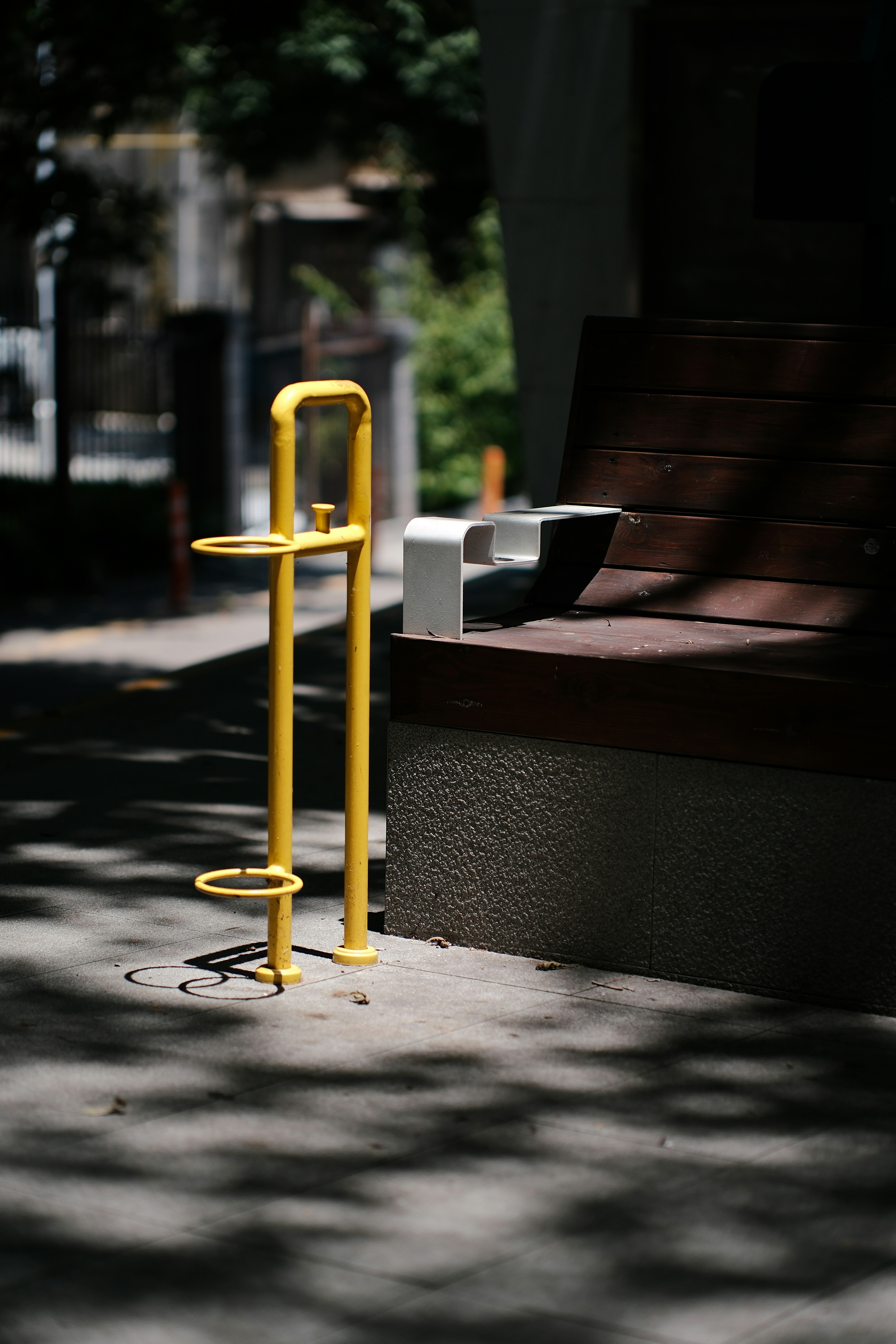 Sunny Yellow Bike Rack in a Quiet Corner
