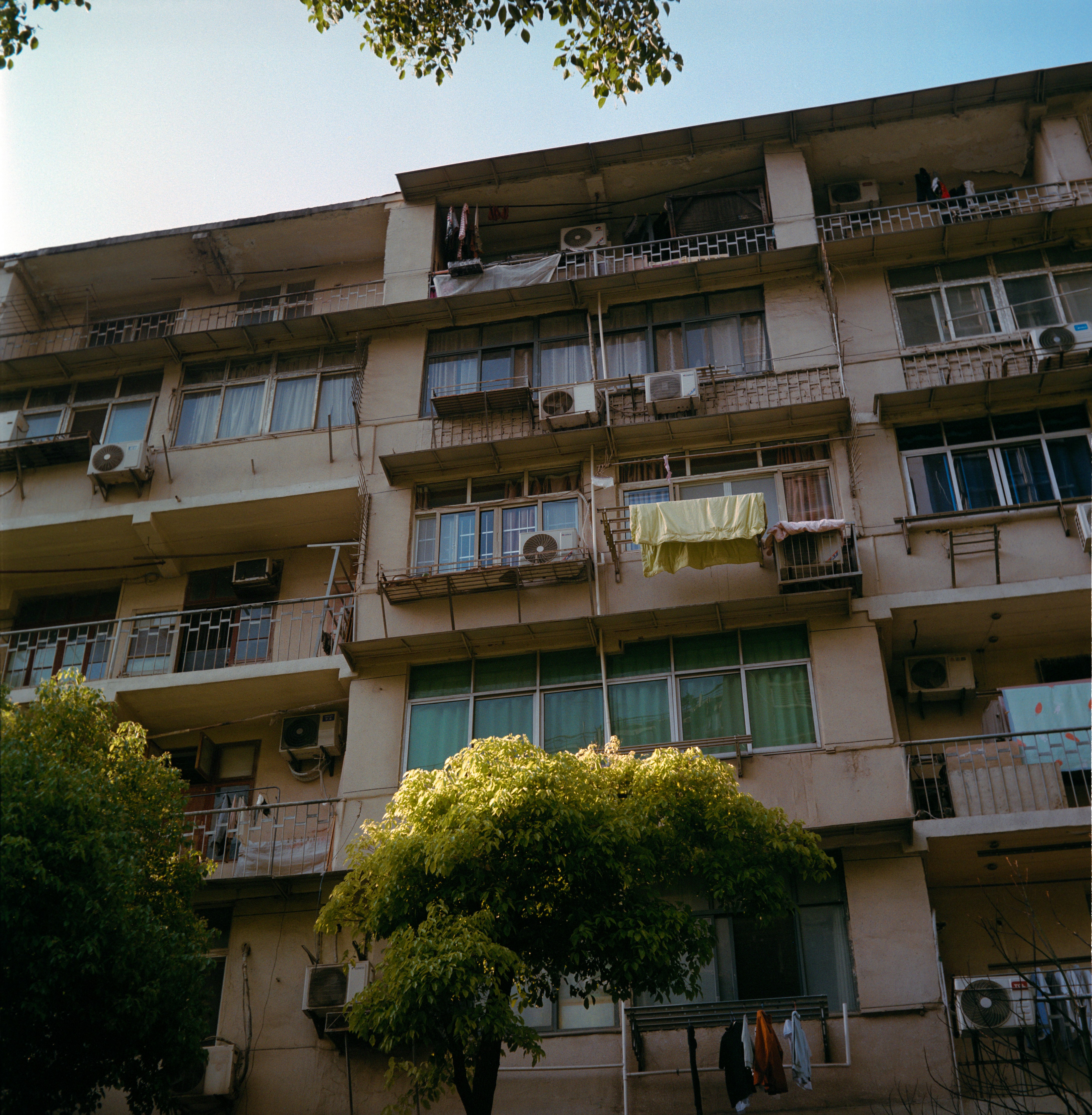 Balconies, Laundry, and Light: A Vertical City Frame