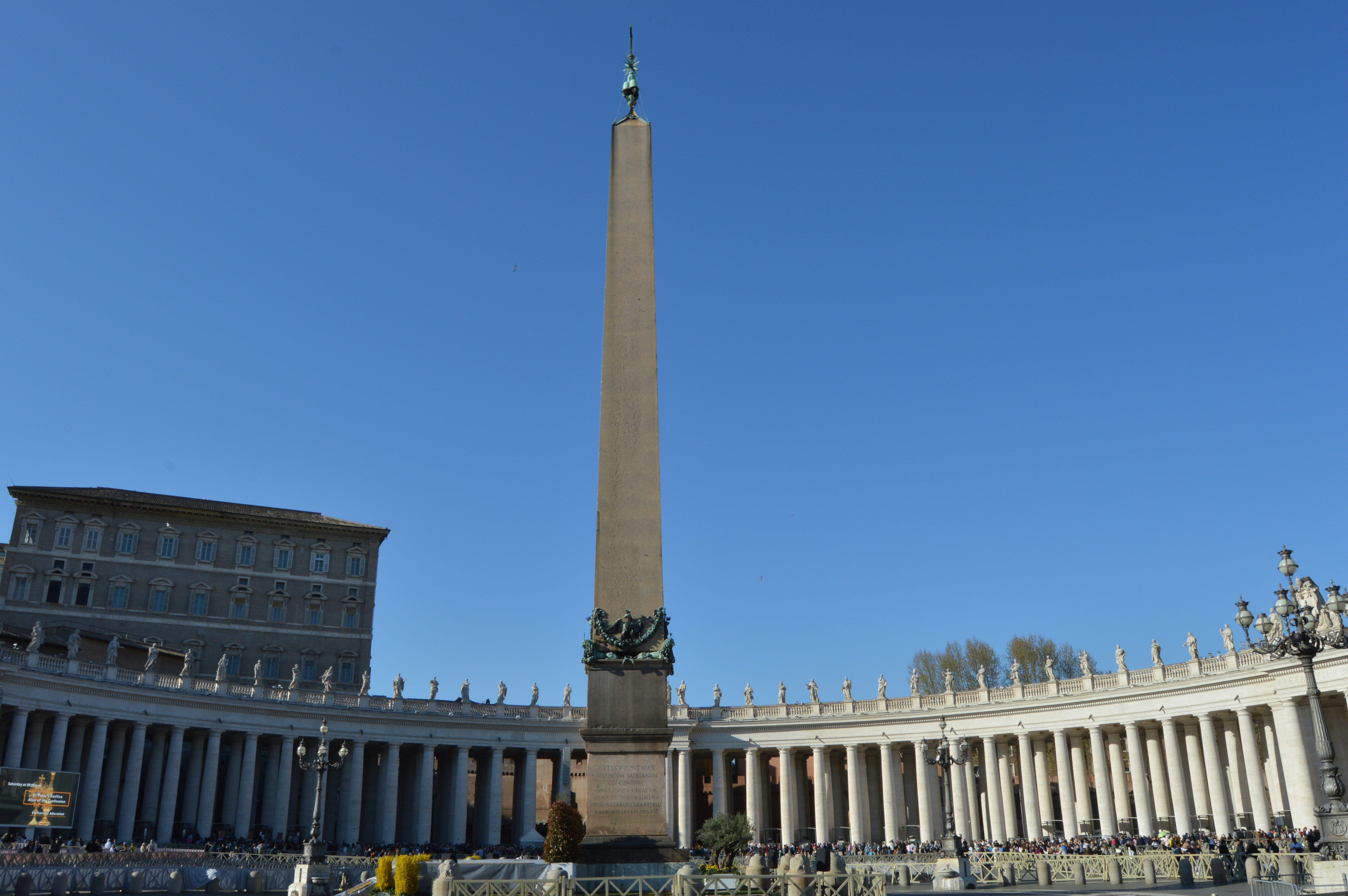 Obelisk Center: A Monumental Axis Surrounded by Colonnades