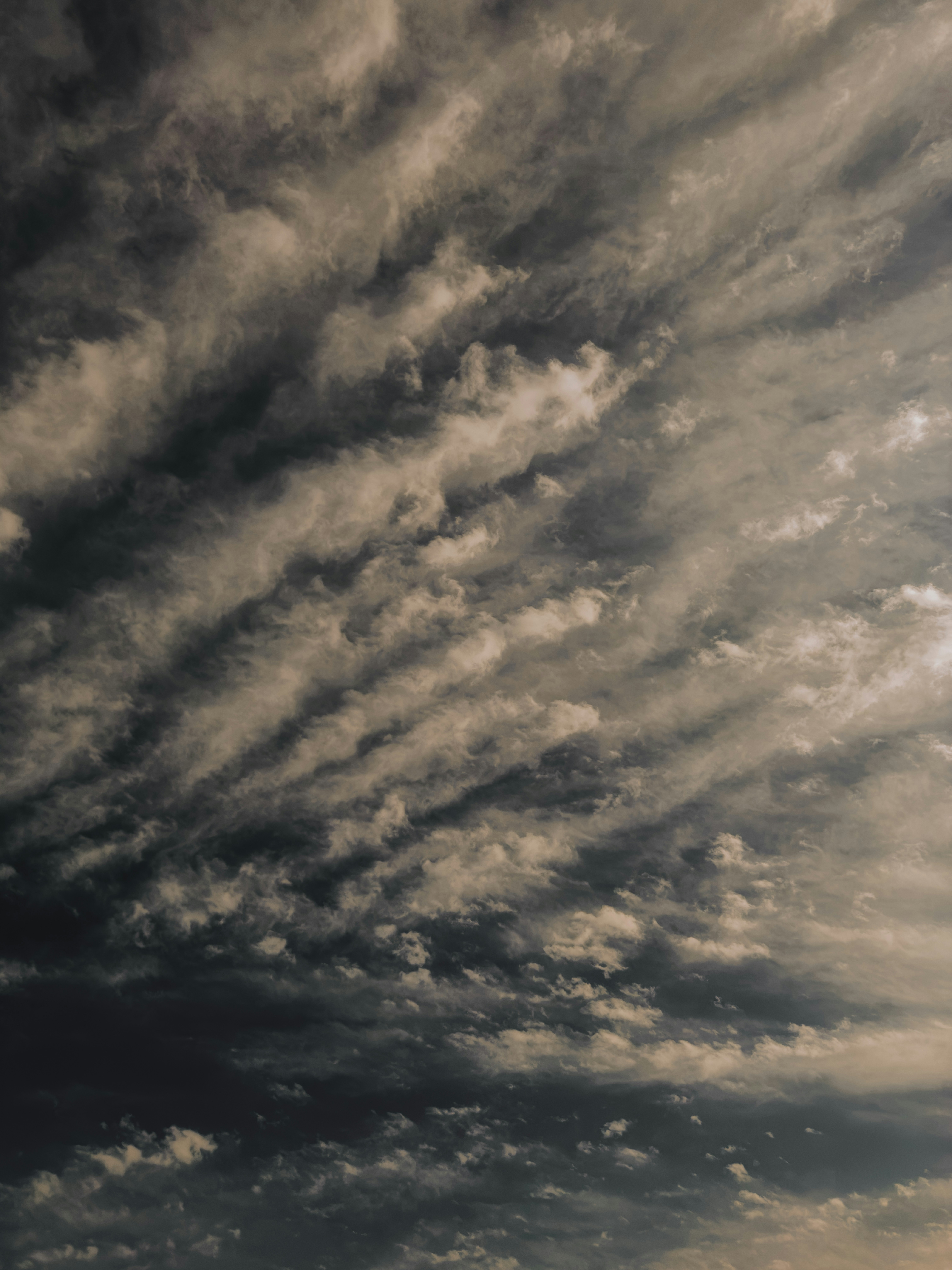 Cloudscape in Motion: Striated Skies Overhead