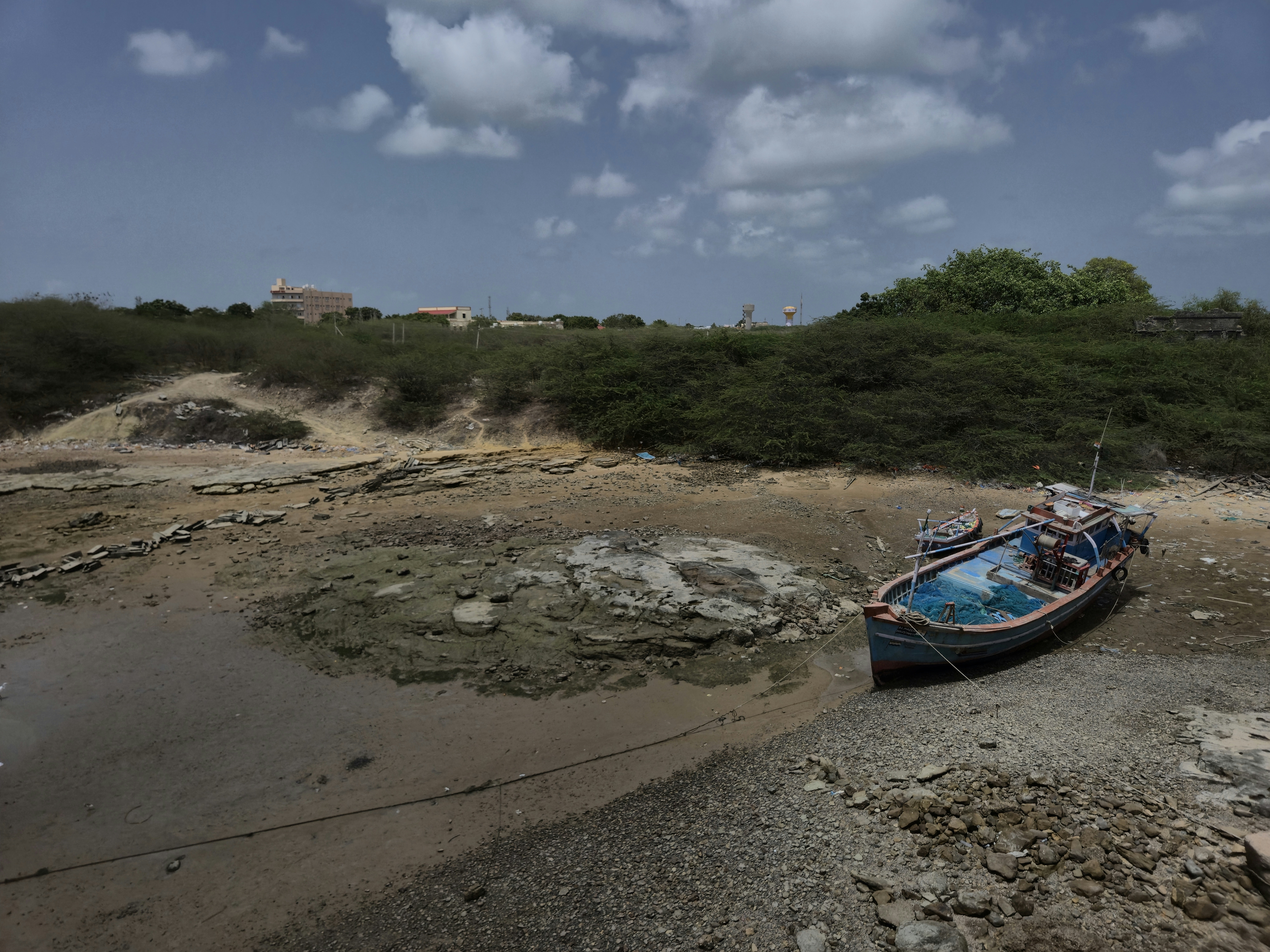Blue Boat at the Quiet Shallow Cove