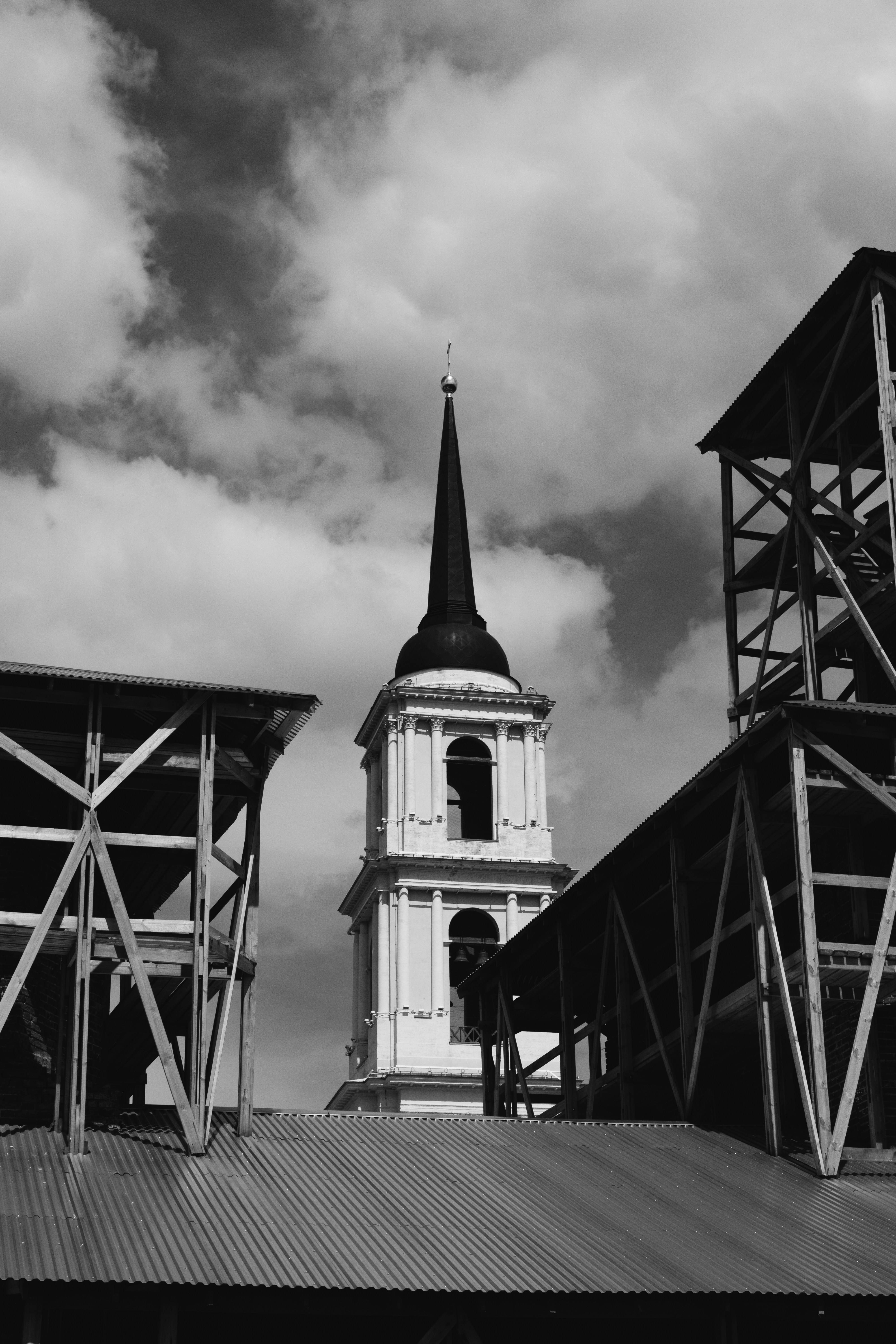 Church Tower Rising Between wooden Scaffolds