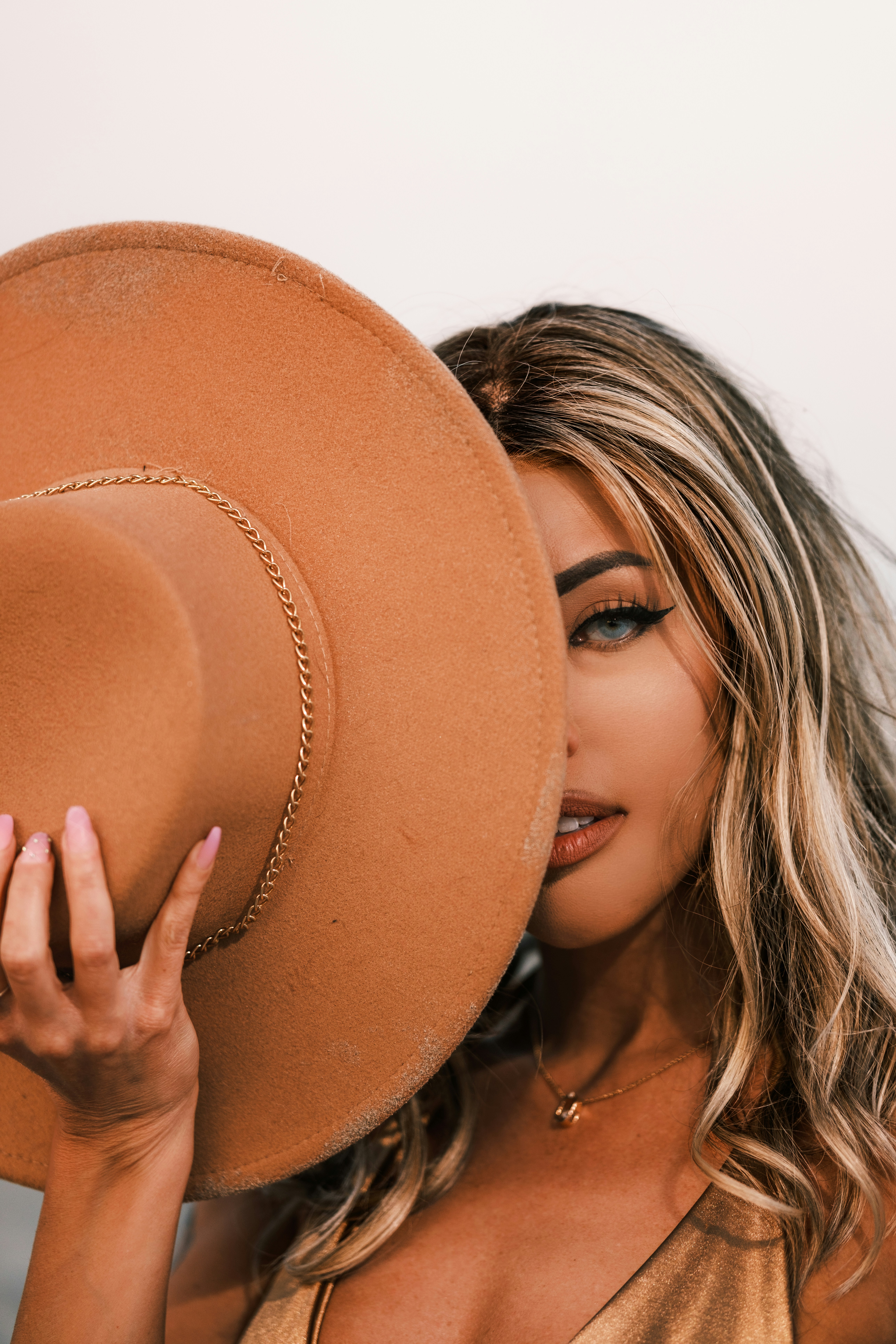 Face Behind the Hat: A Glimpse of Style and Shadow