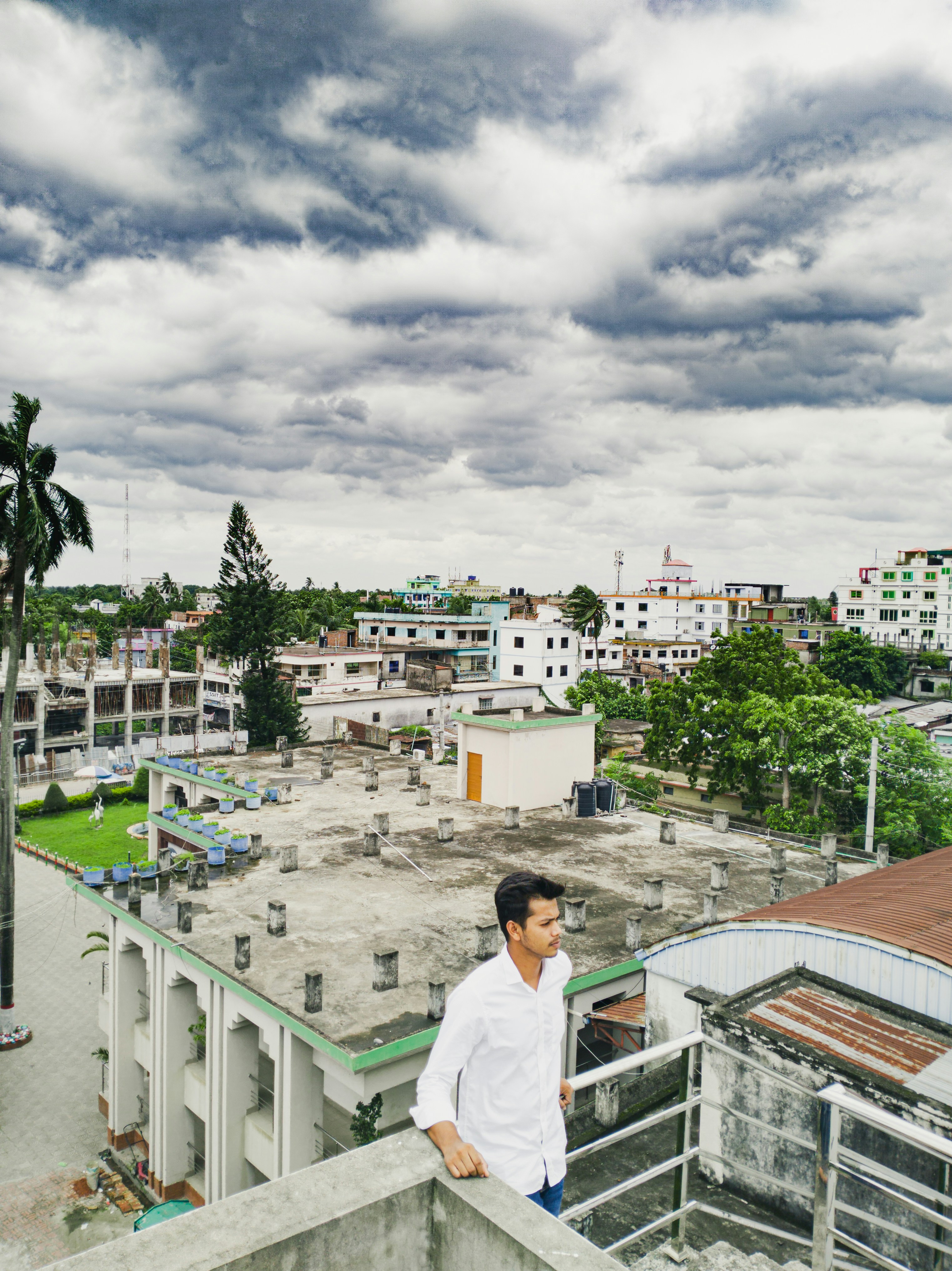 Rooftop Portrait Over a Quiet Town