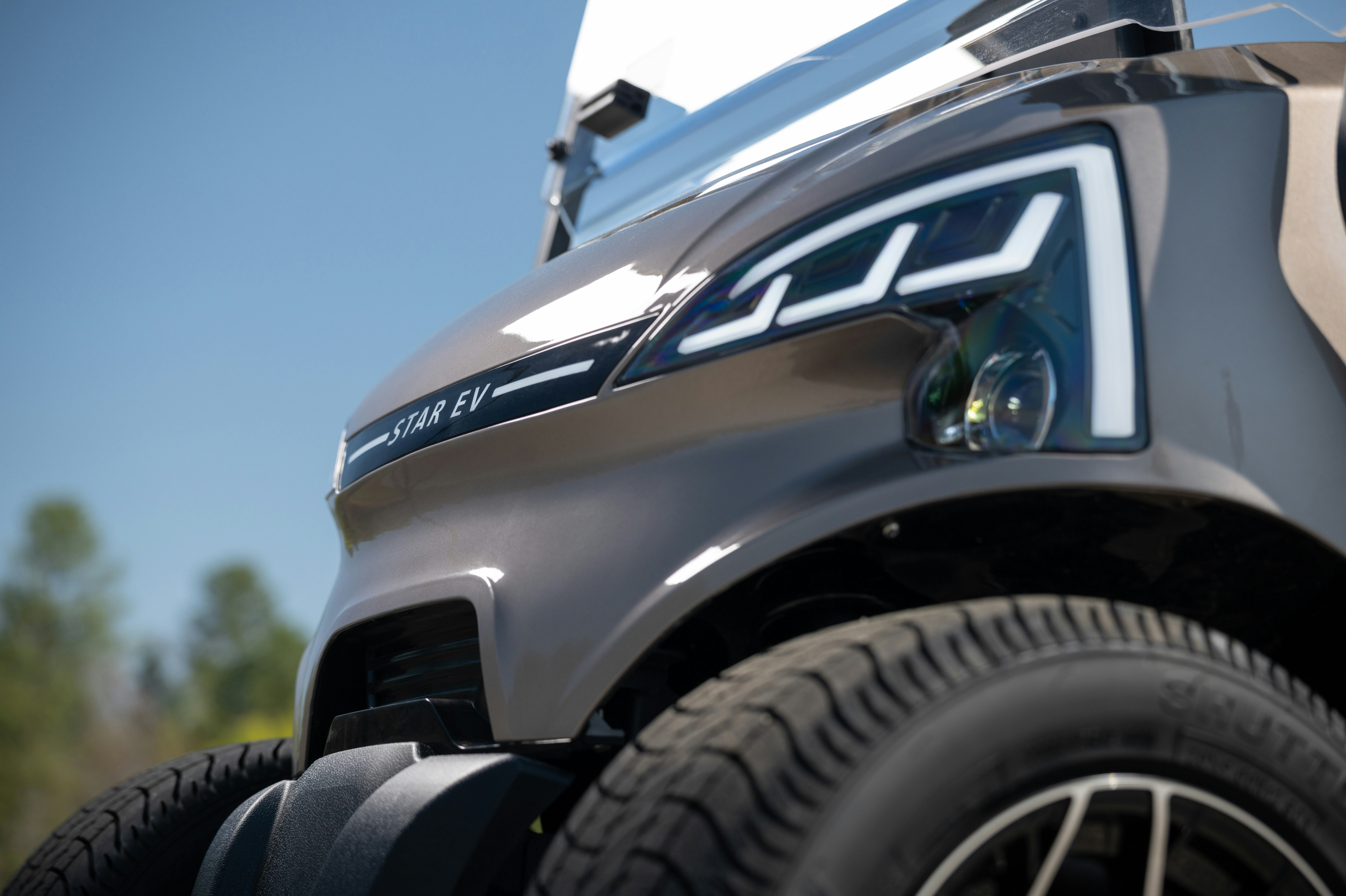 Low-Angle Close-Up of the STAR EV Front Wheel and Headlight