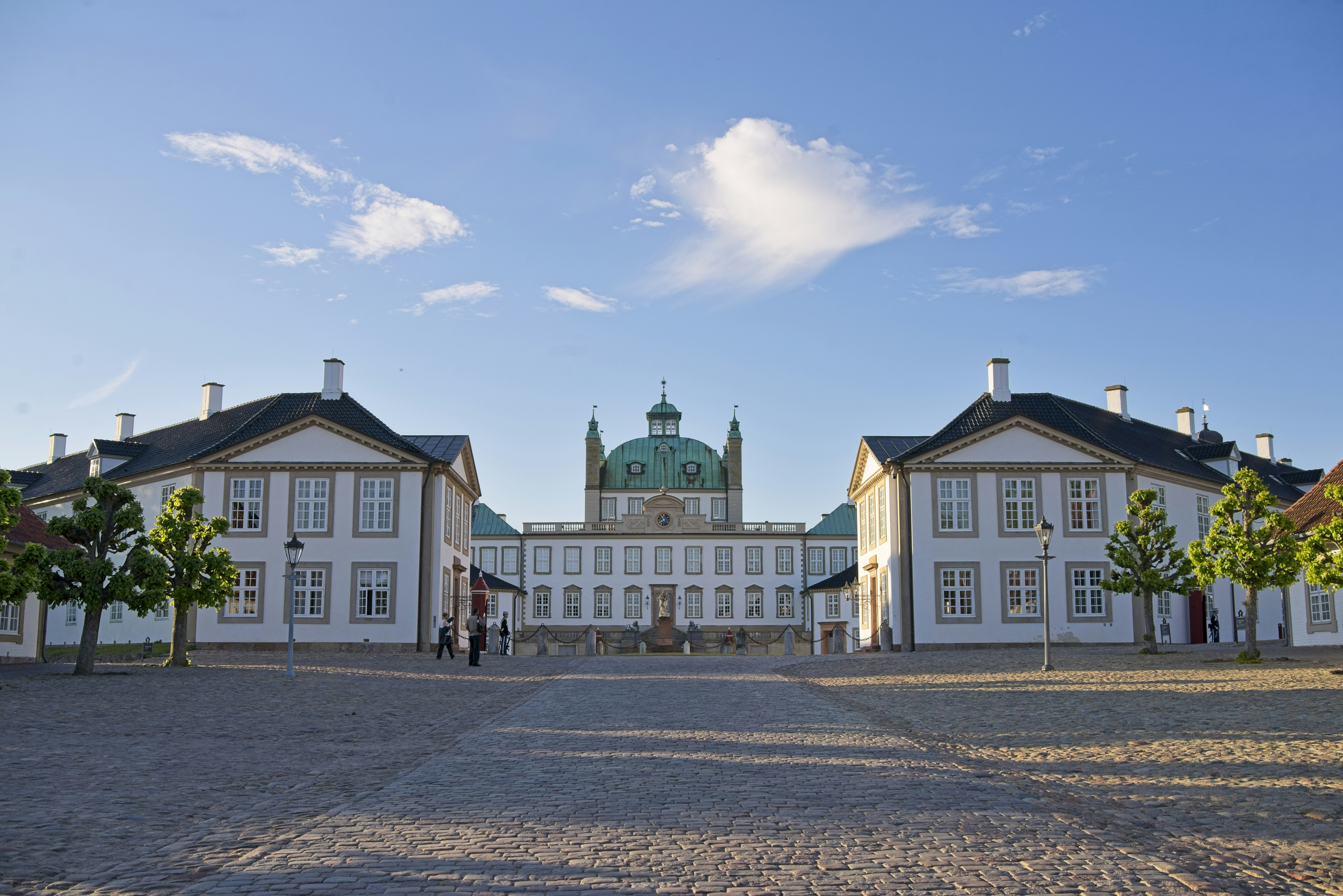 Symmetrical Court of the Danish Baroque: Central Facade under a Clear Sky