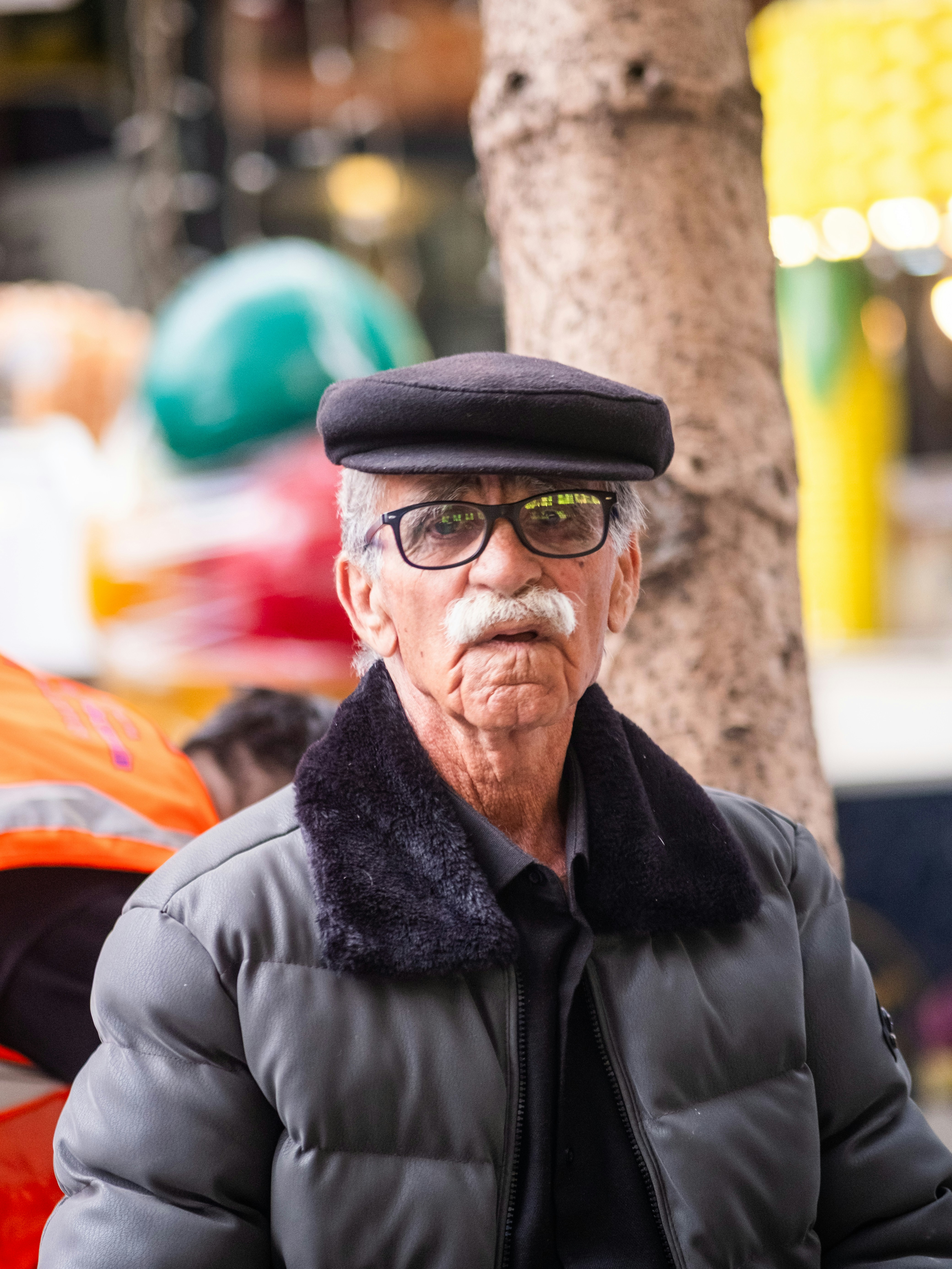 The Elder in Focus: Quiet Dignity Beneath the Flat Cap