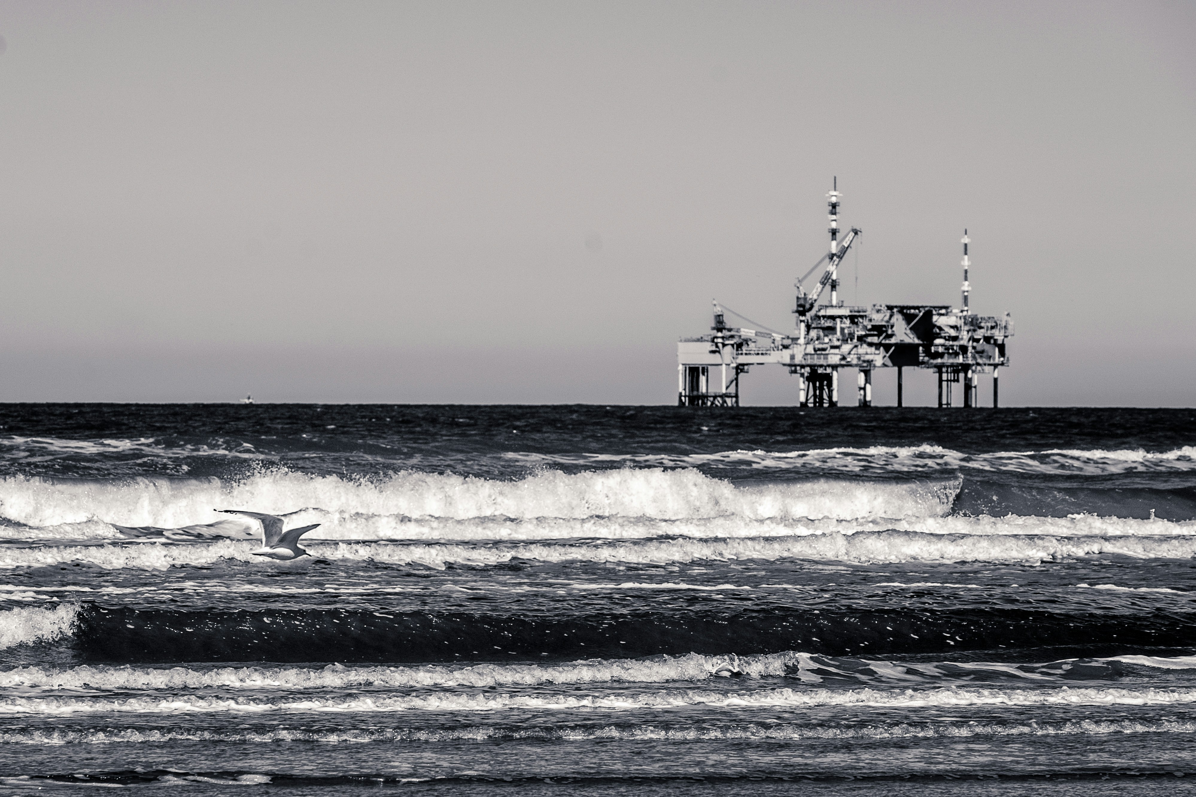 Rigging at the Horizon: Offshore Platform Cuts the Calm