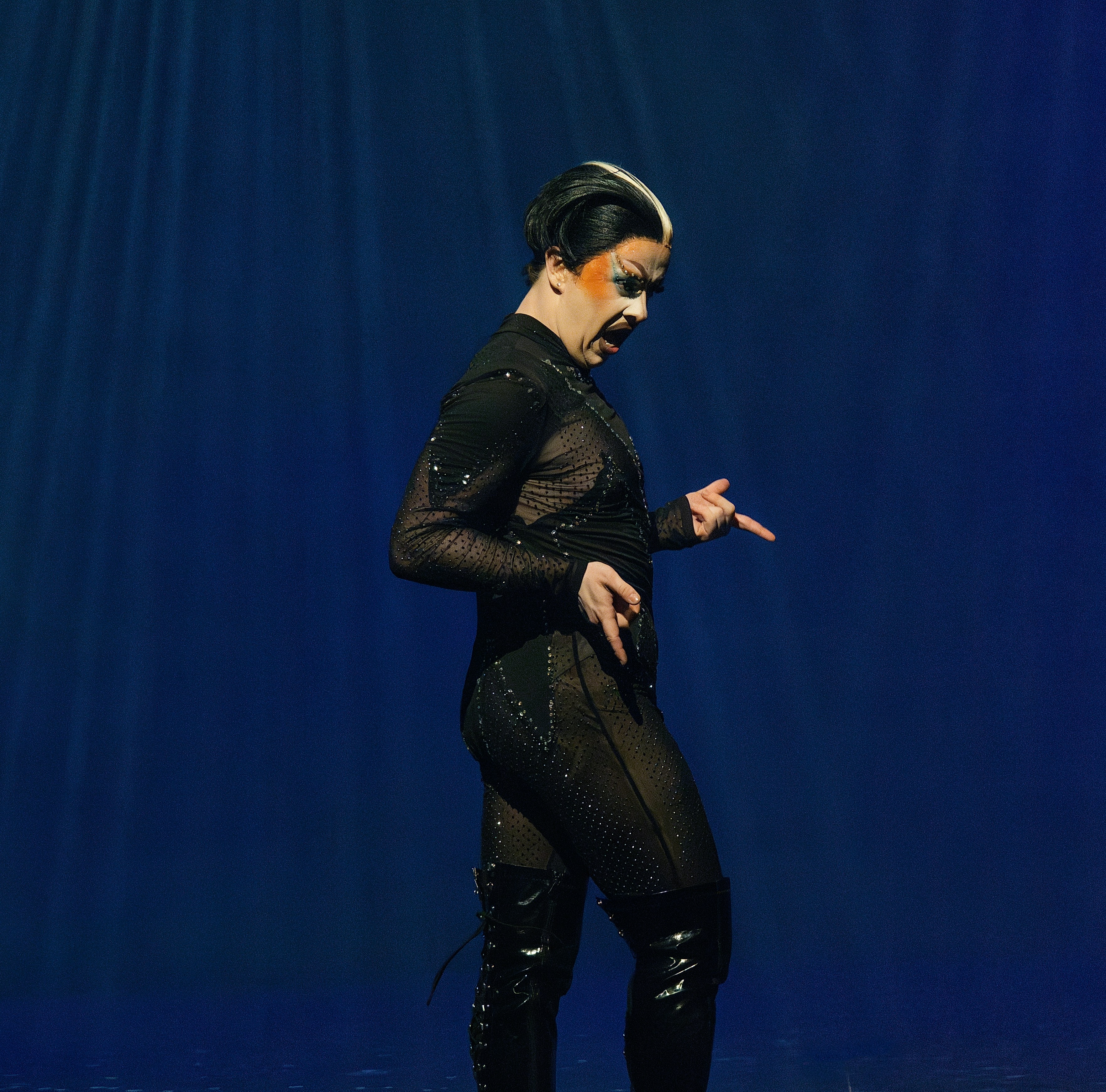 Stride and Shadow: A Dancer in a Midnight Grid