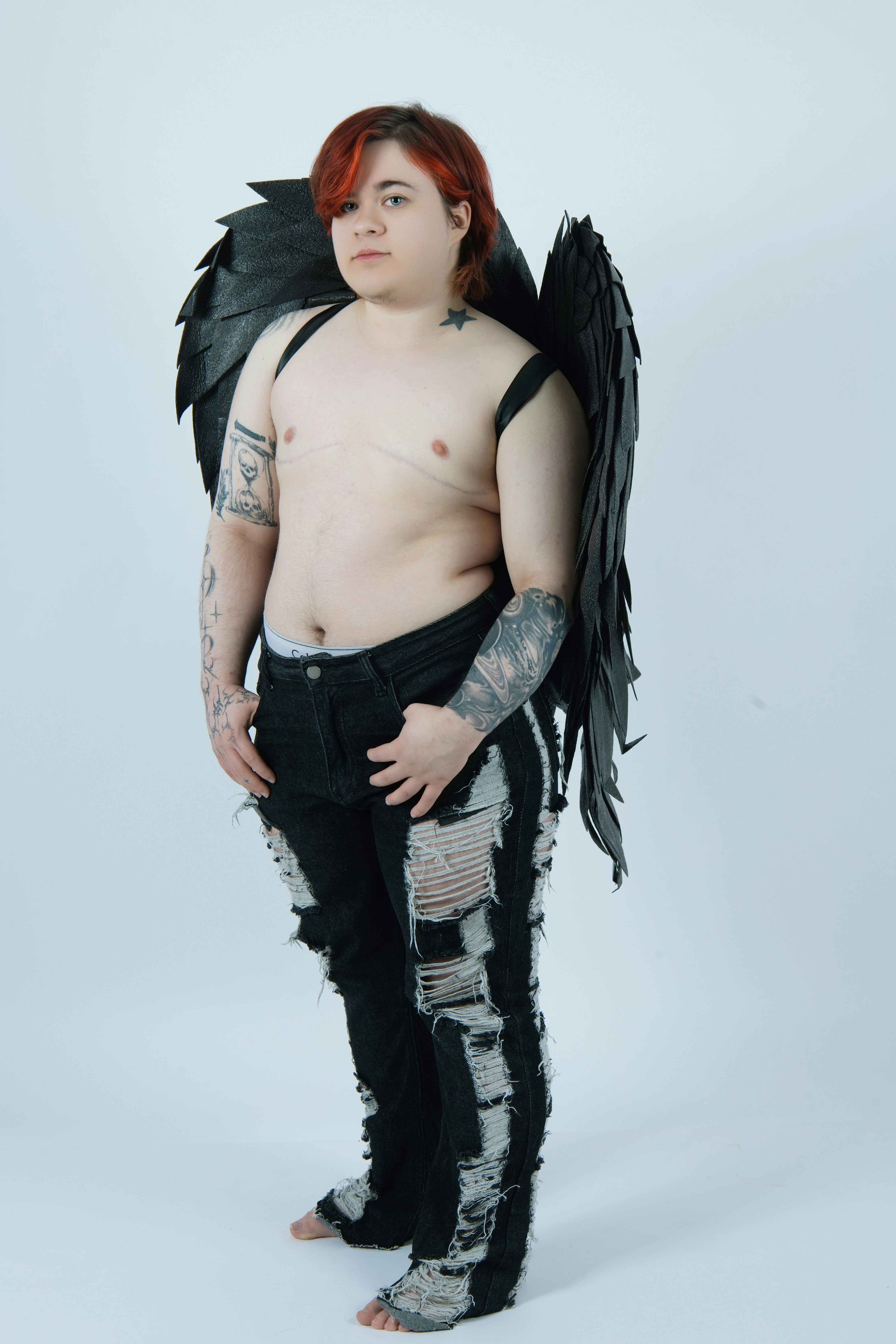 Wings of Contrast: A Portrait in Dark Feathers