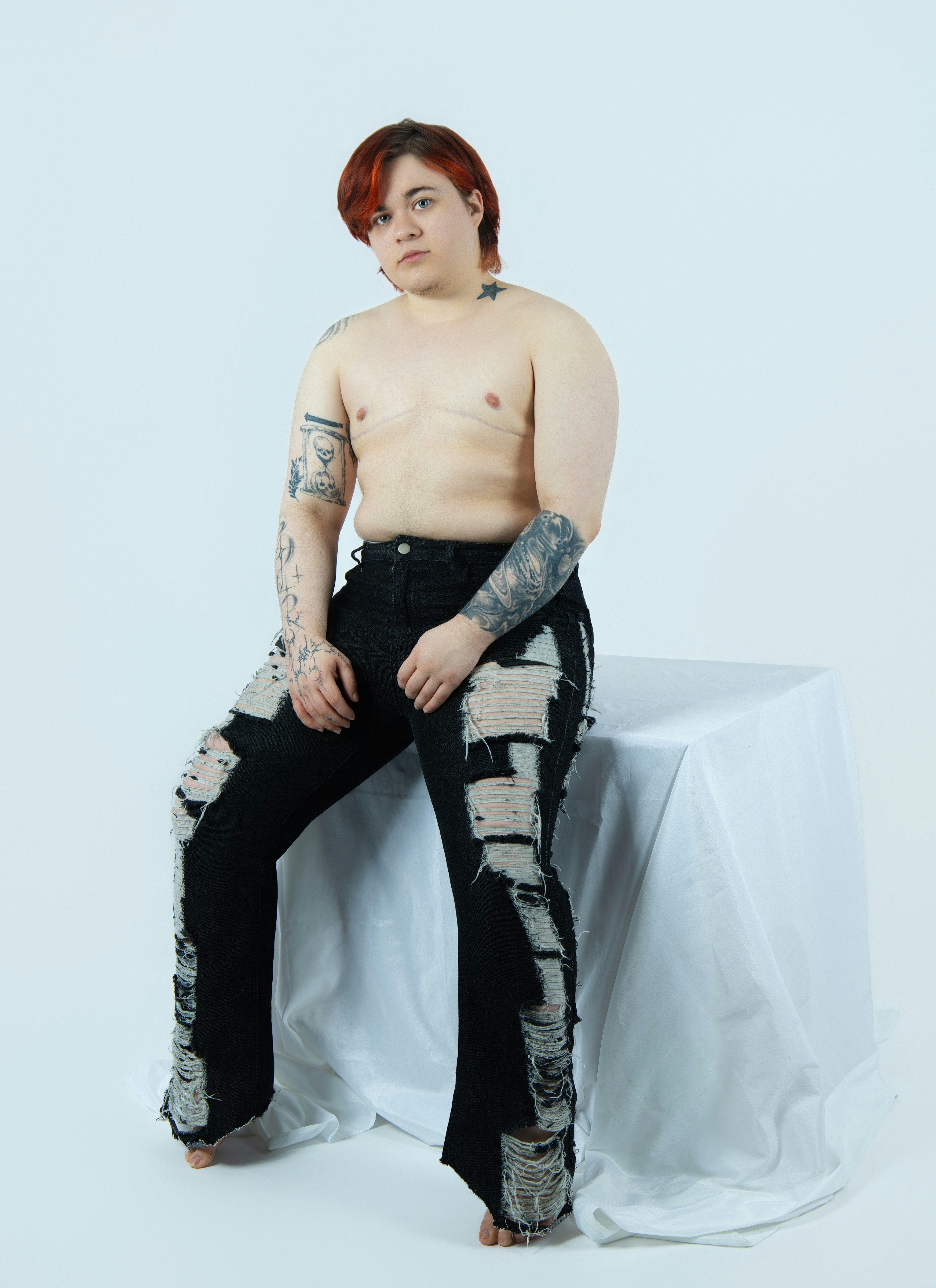Untamed Studio Portrait: Confidence in Distressed Denim