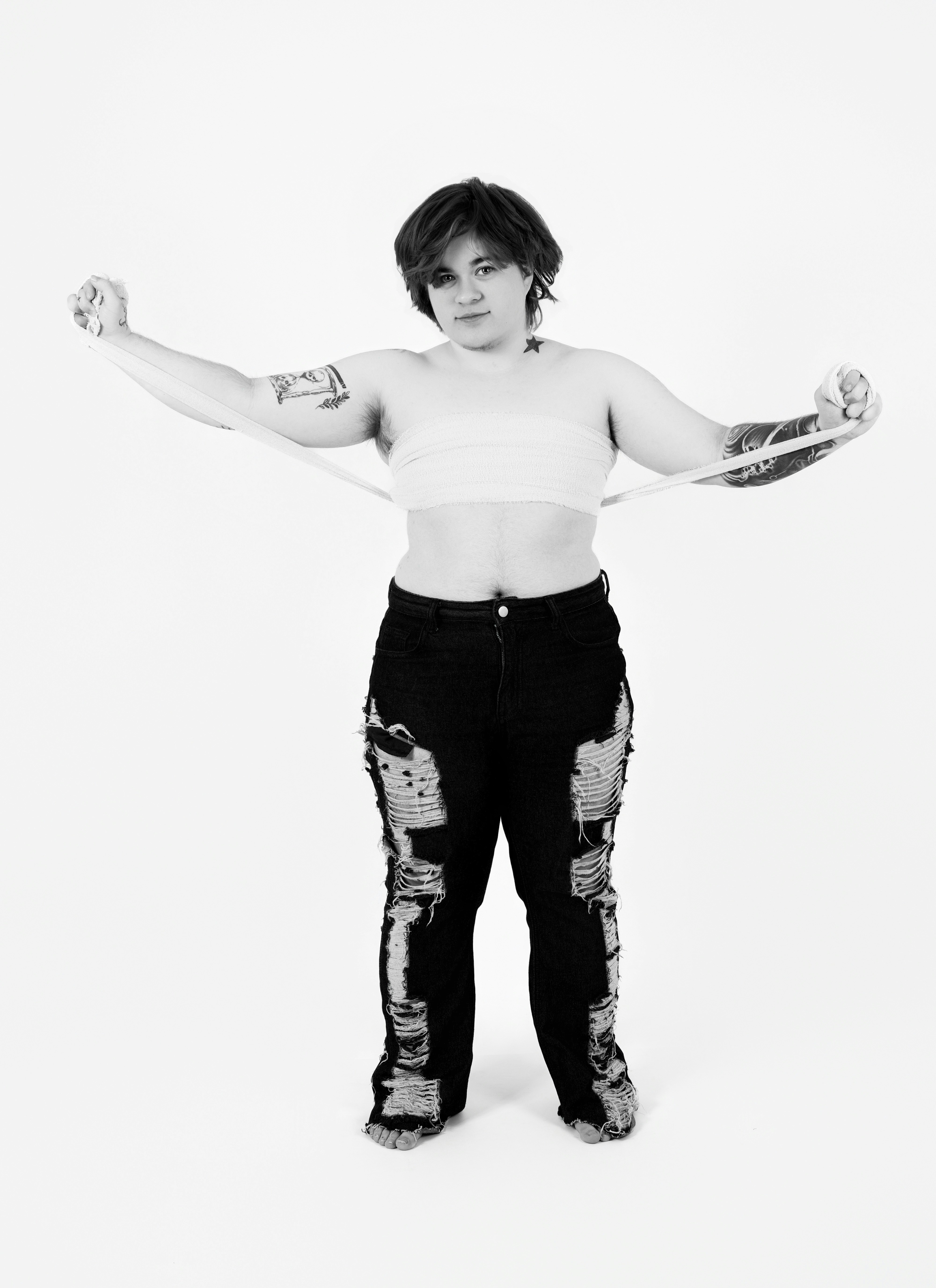 Stripped Down Confidence: A Portrait in High-Risk Denim