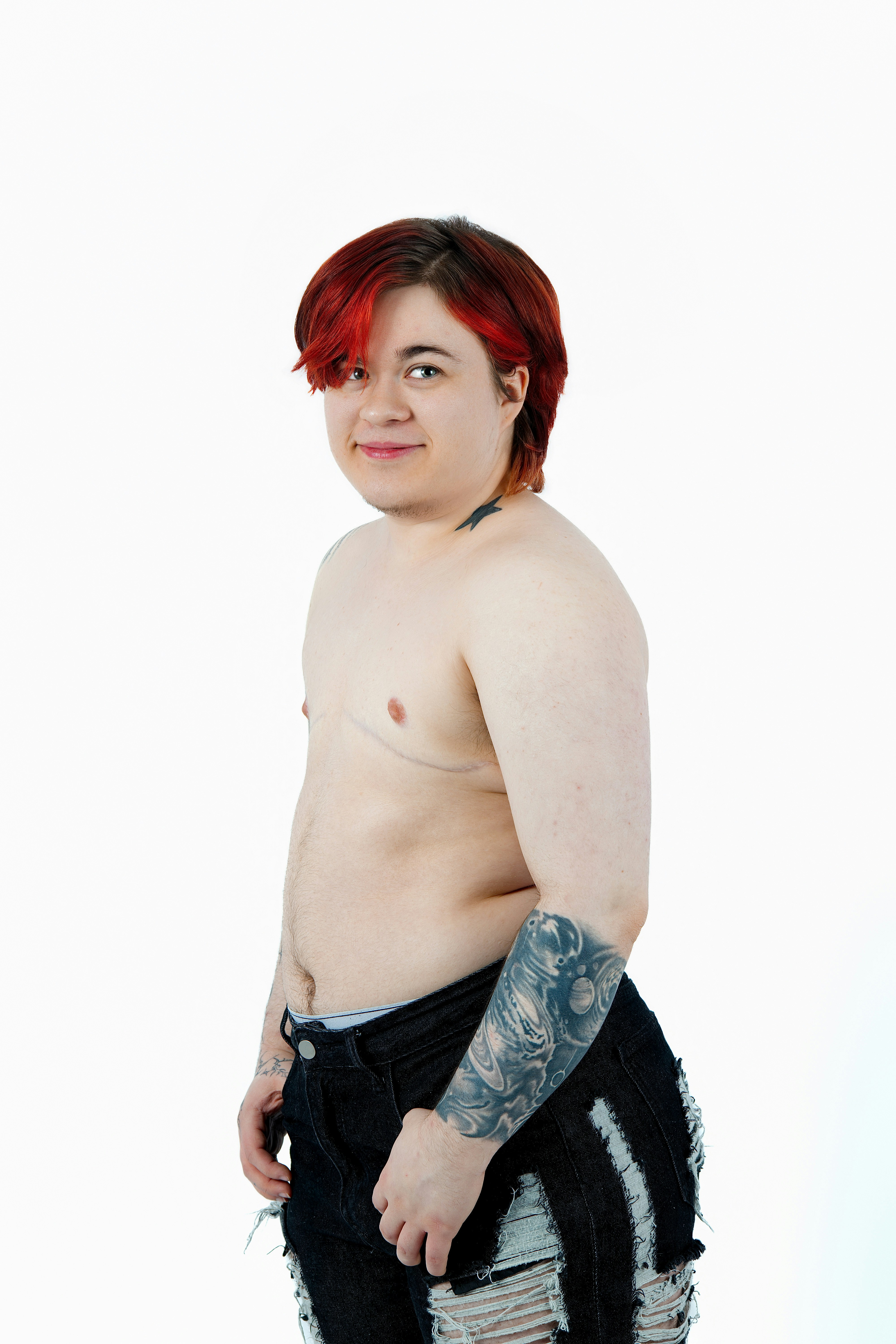 Red-Tipped Portrait: A Confident Stance in the Studio