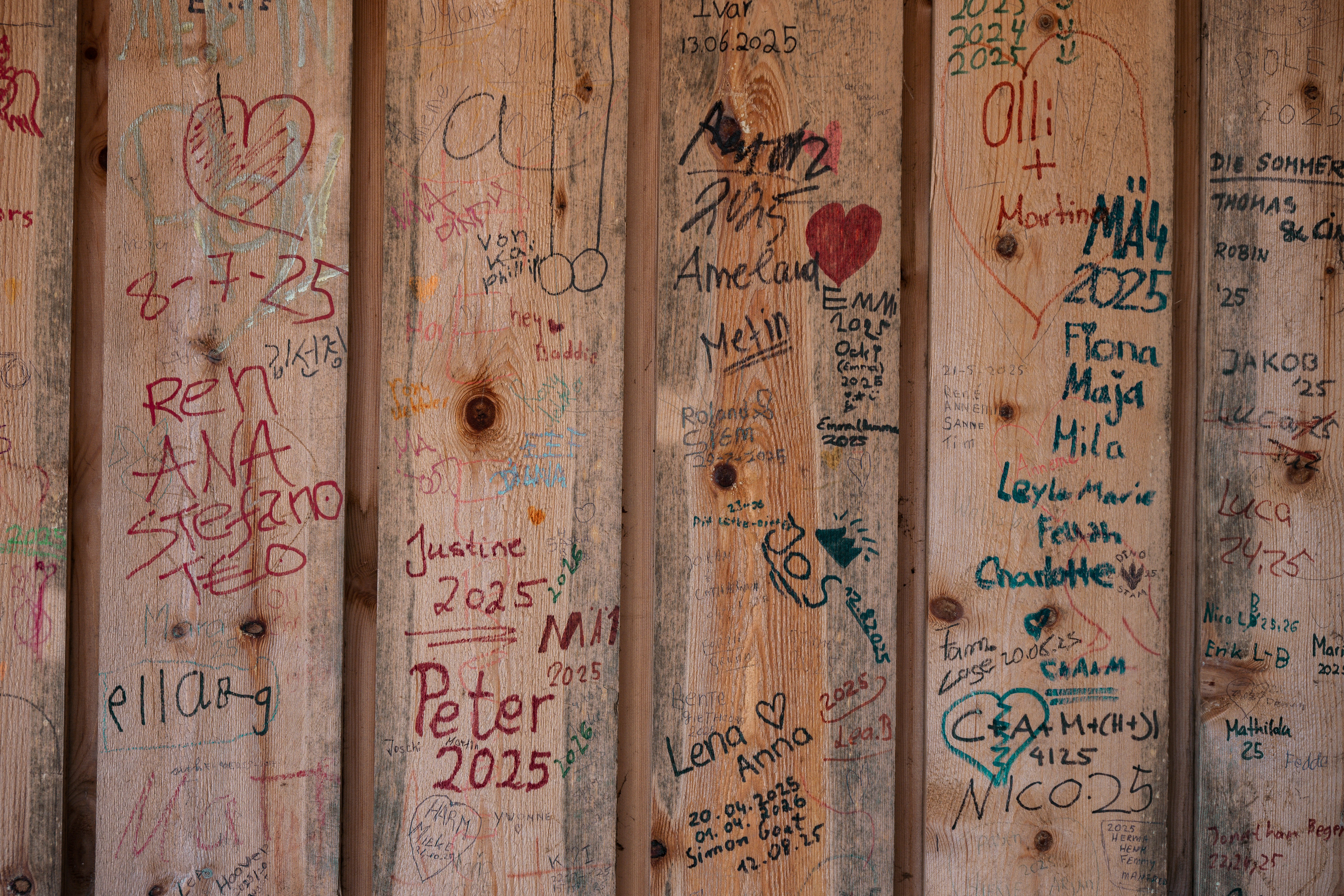 Whispers in Weathered Wood: Messages Across Planks