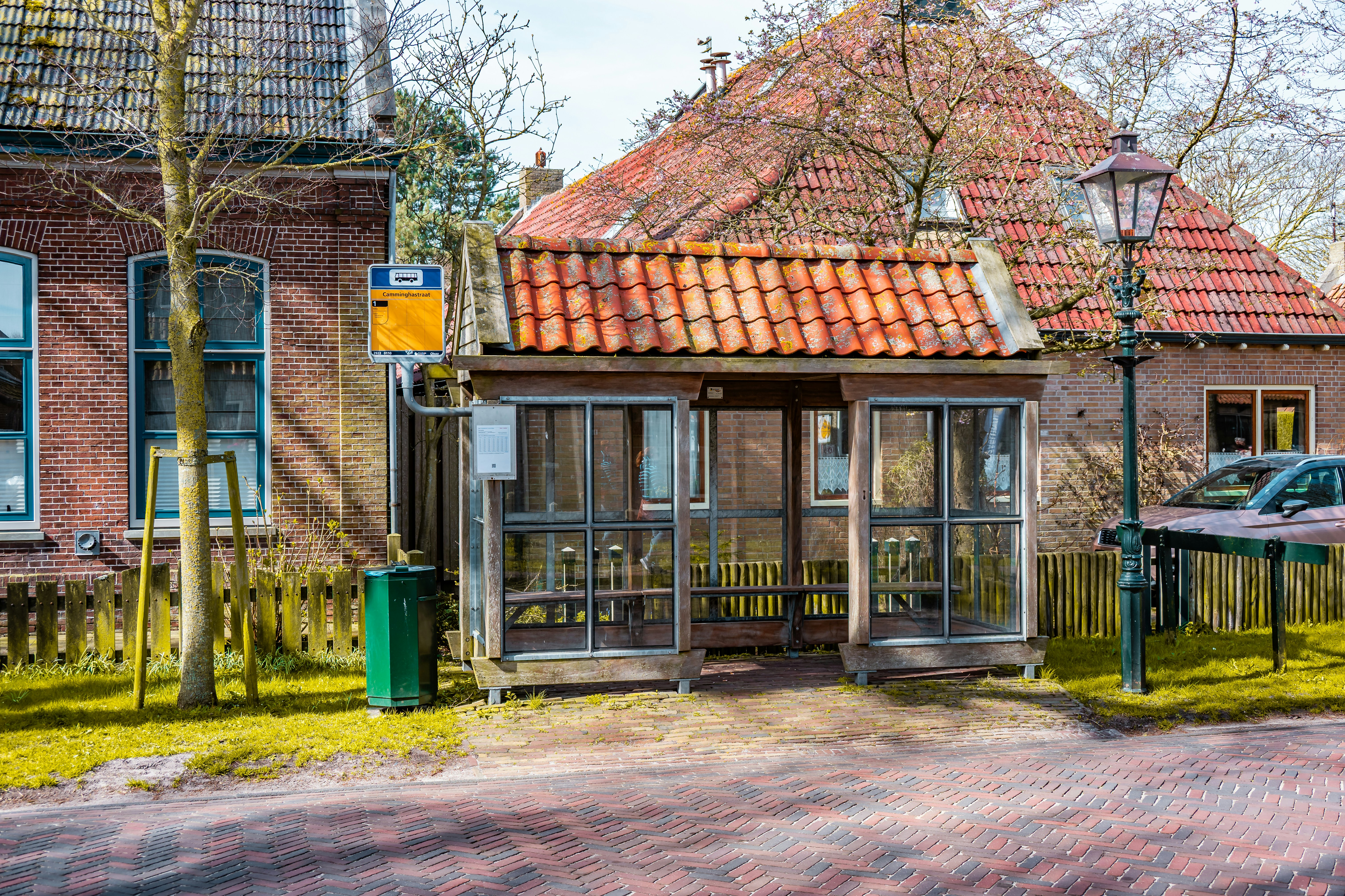 Dutch Train Stop: A Quiet Station Corner by a Cozy Sheltered Bench