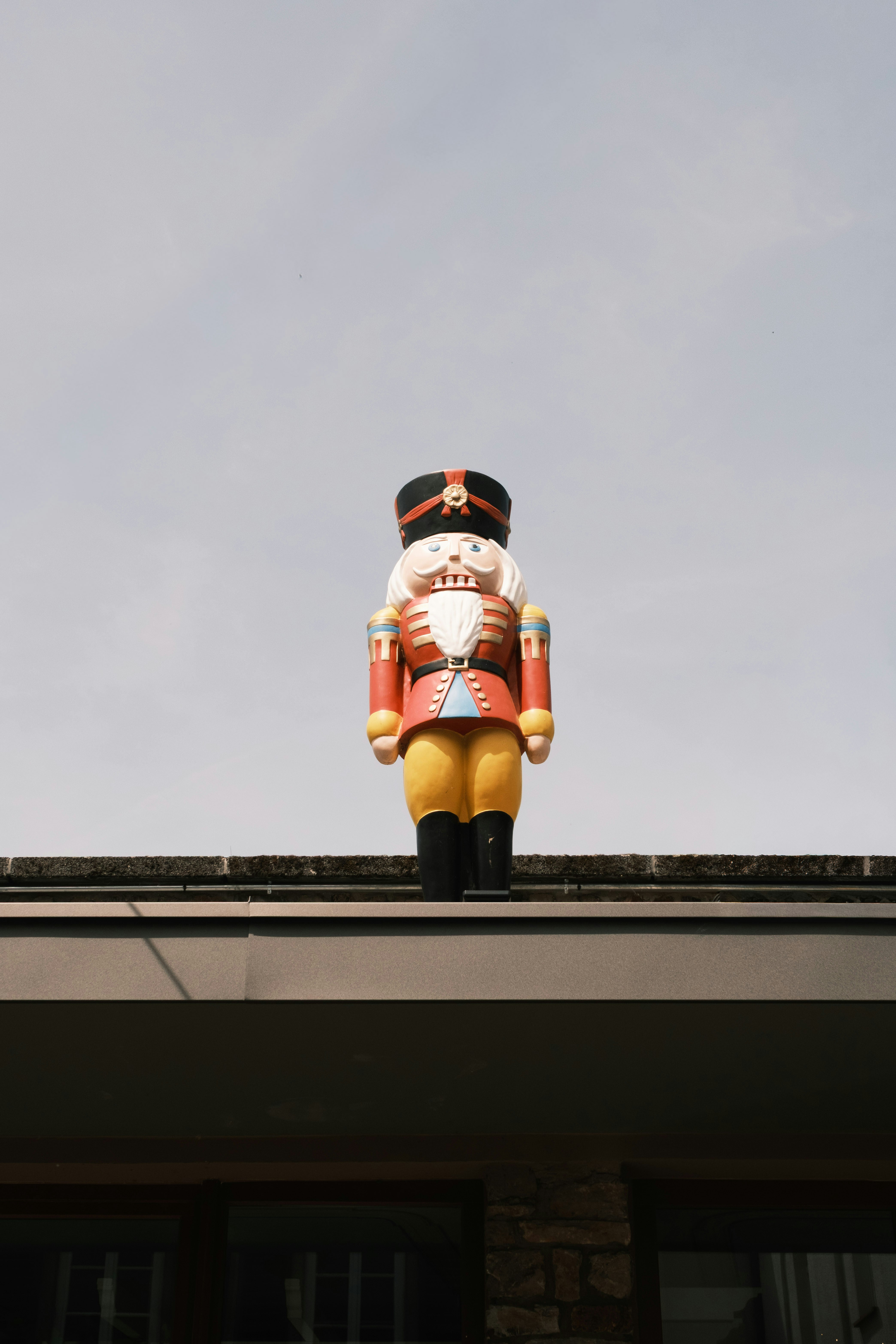  sentinel at the roofline: a nutcracker watches over the town