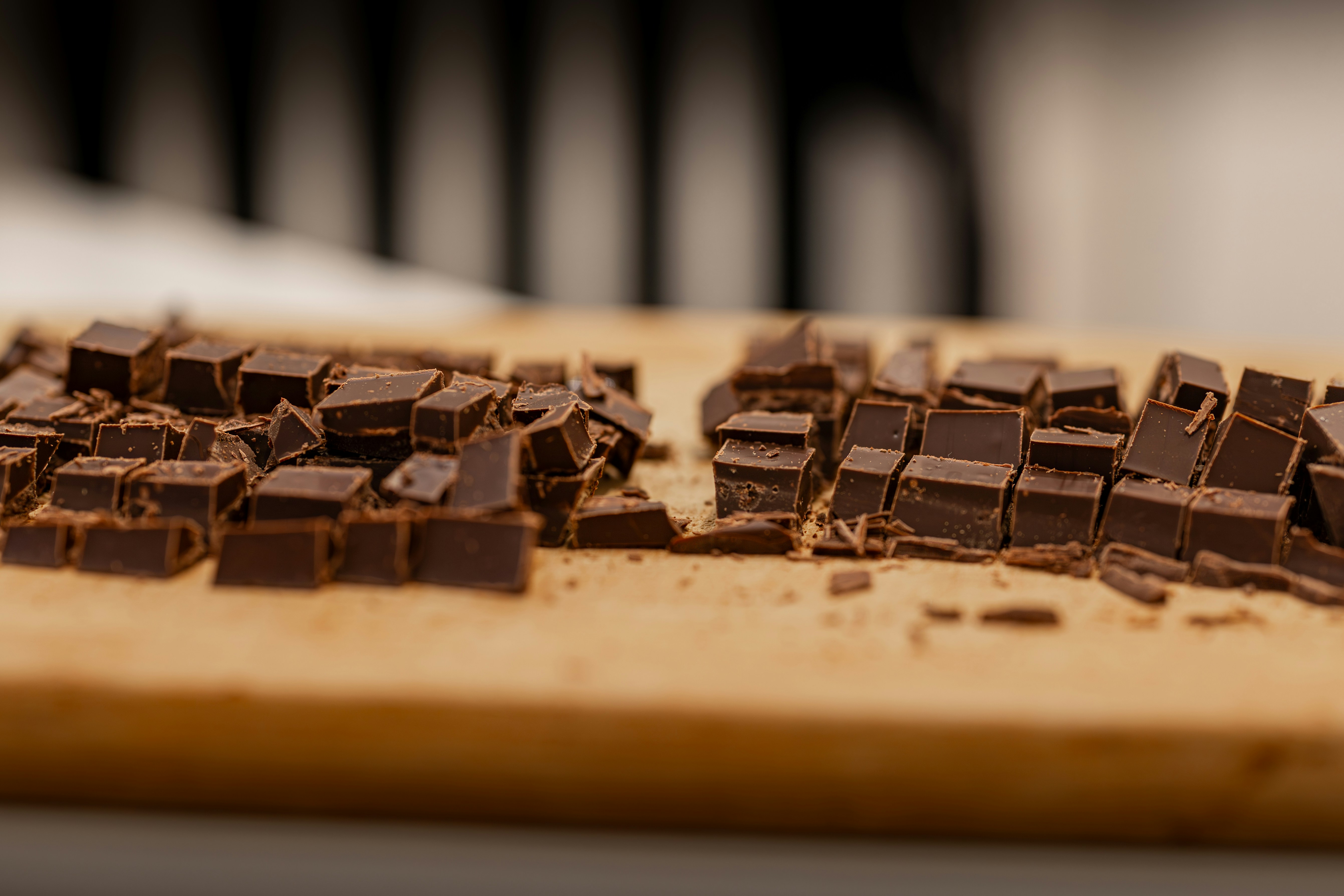 Chopped Chocolate Row on a Wooden Board
