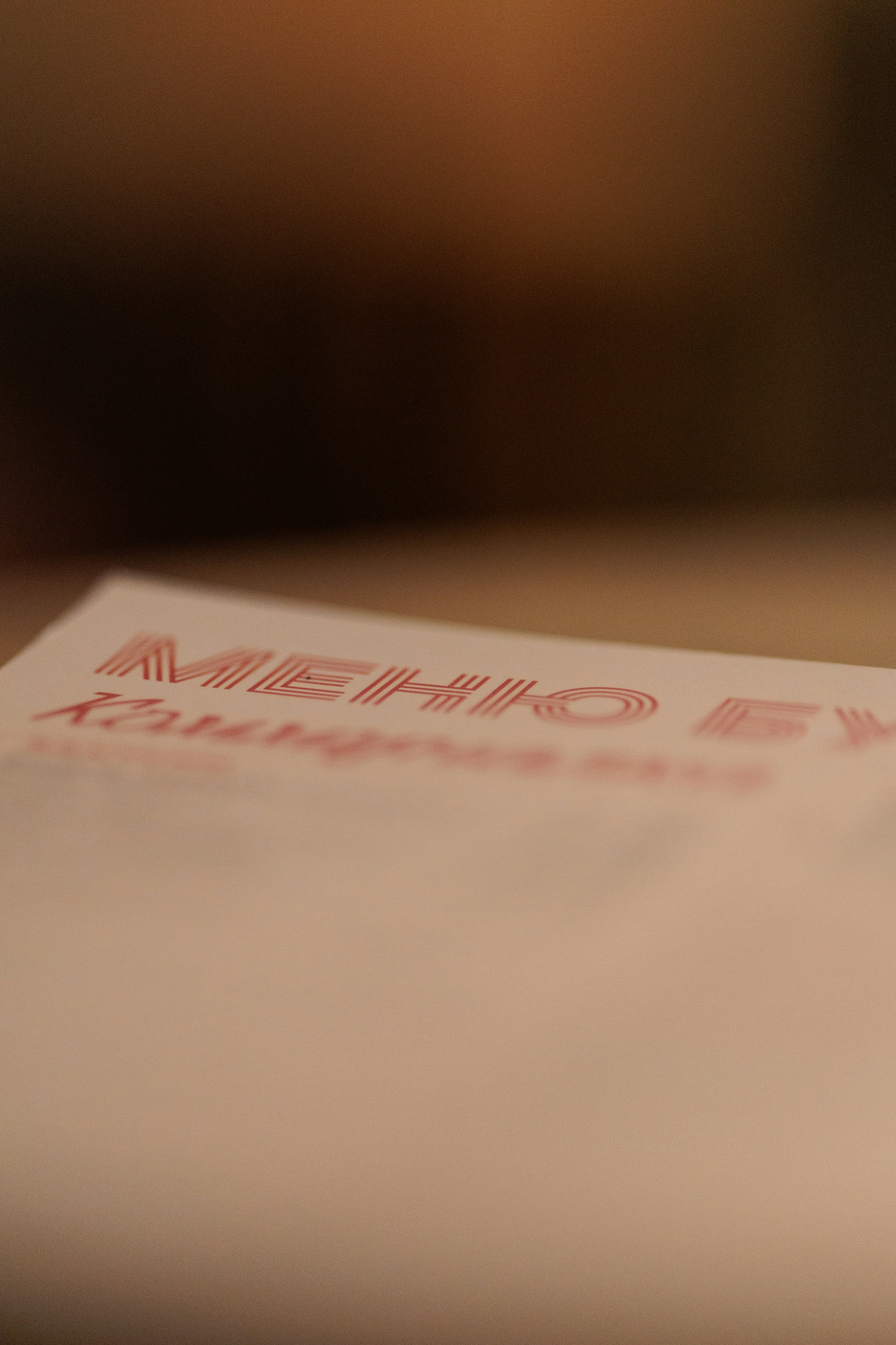 Faded ticket on a soft-lit surface