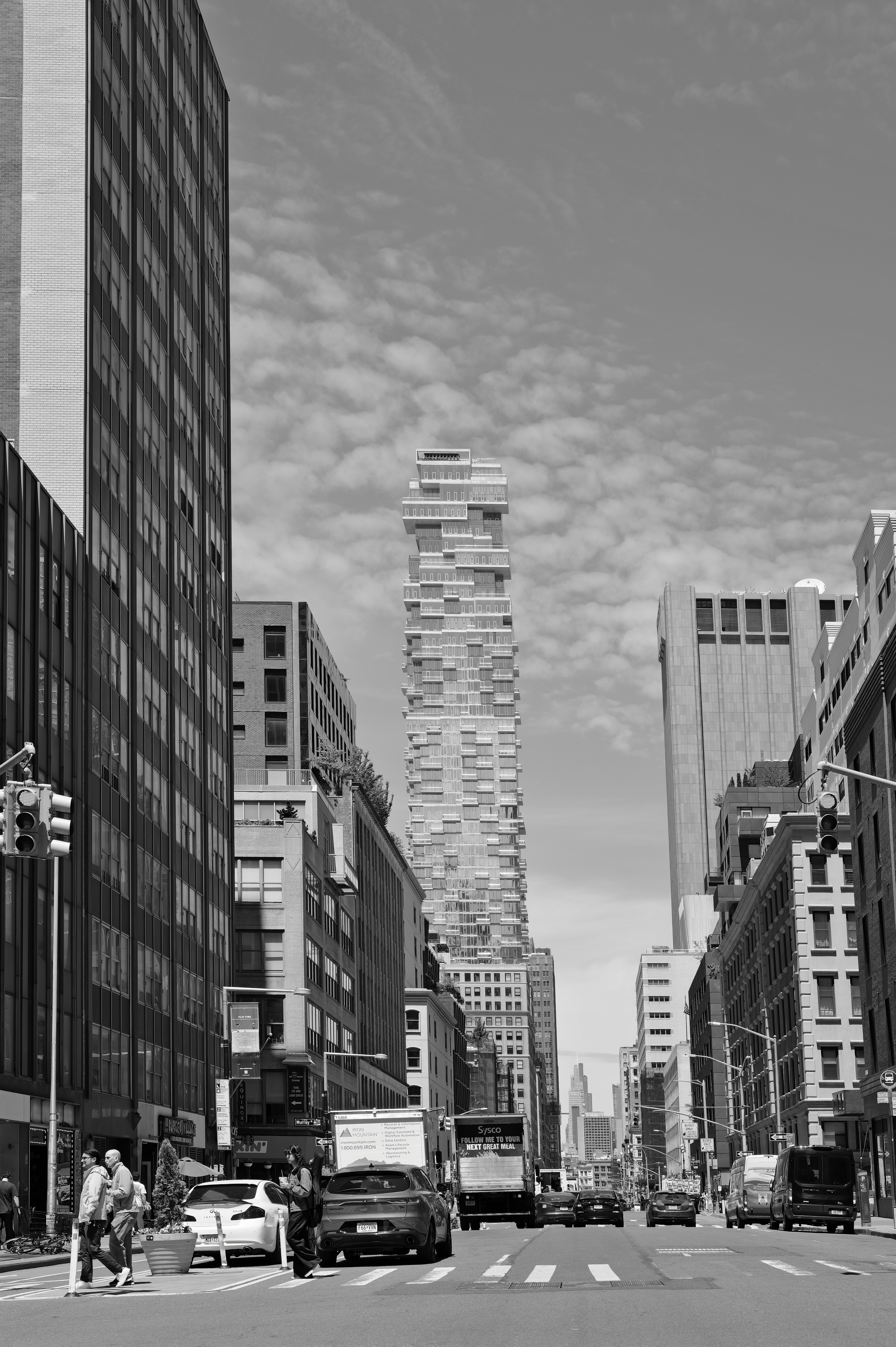 Skyline Cascade: The Tower of Blocky Heights Rising Over a City in Motion