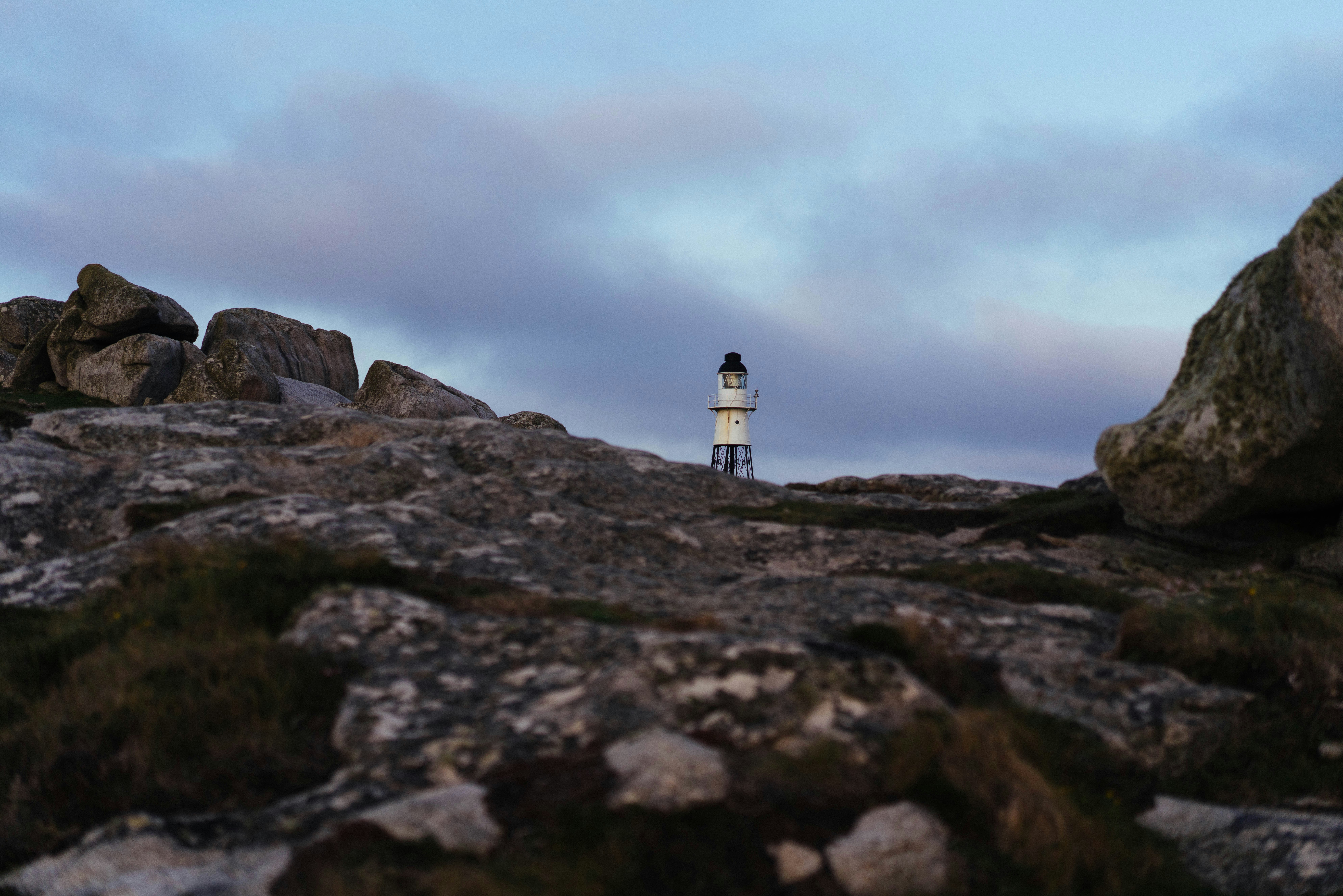 Lighthouse Among Stone: A Quiet Sentinel on the Ridge