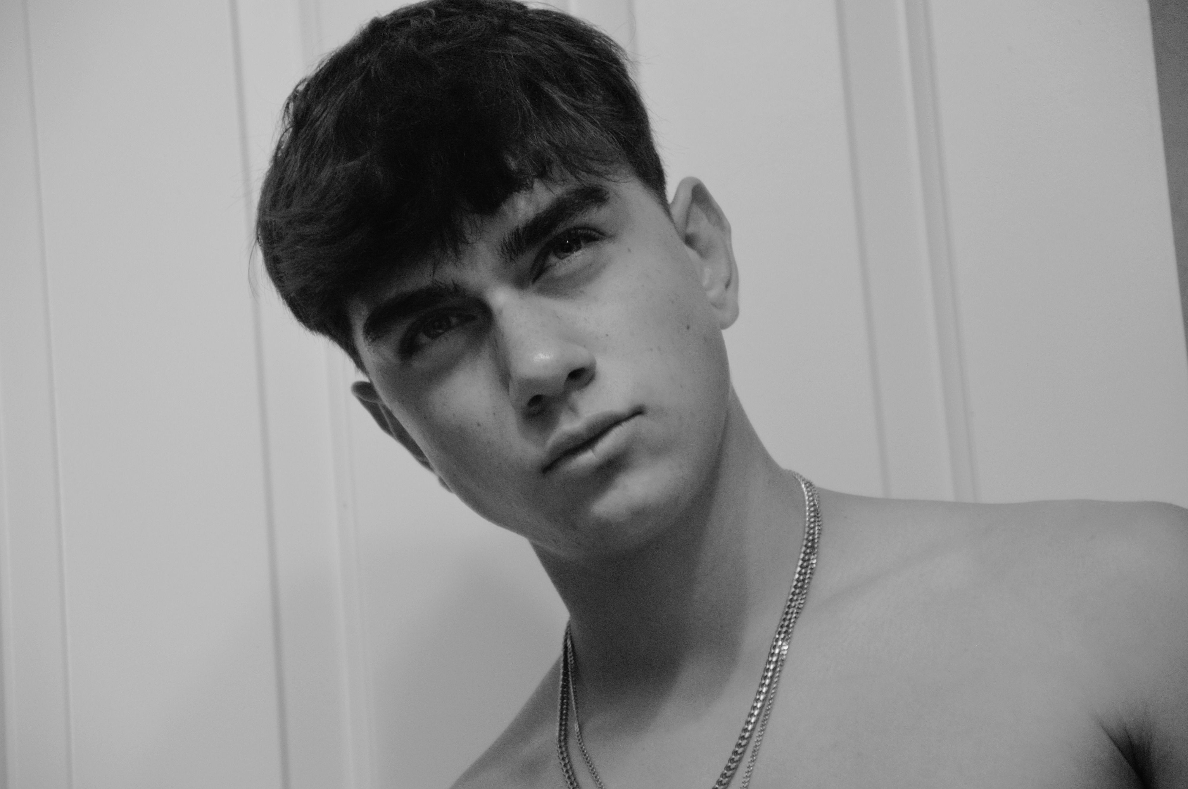 Mono strands: a pensive portrait tilted toward the lens