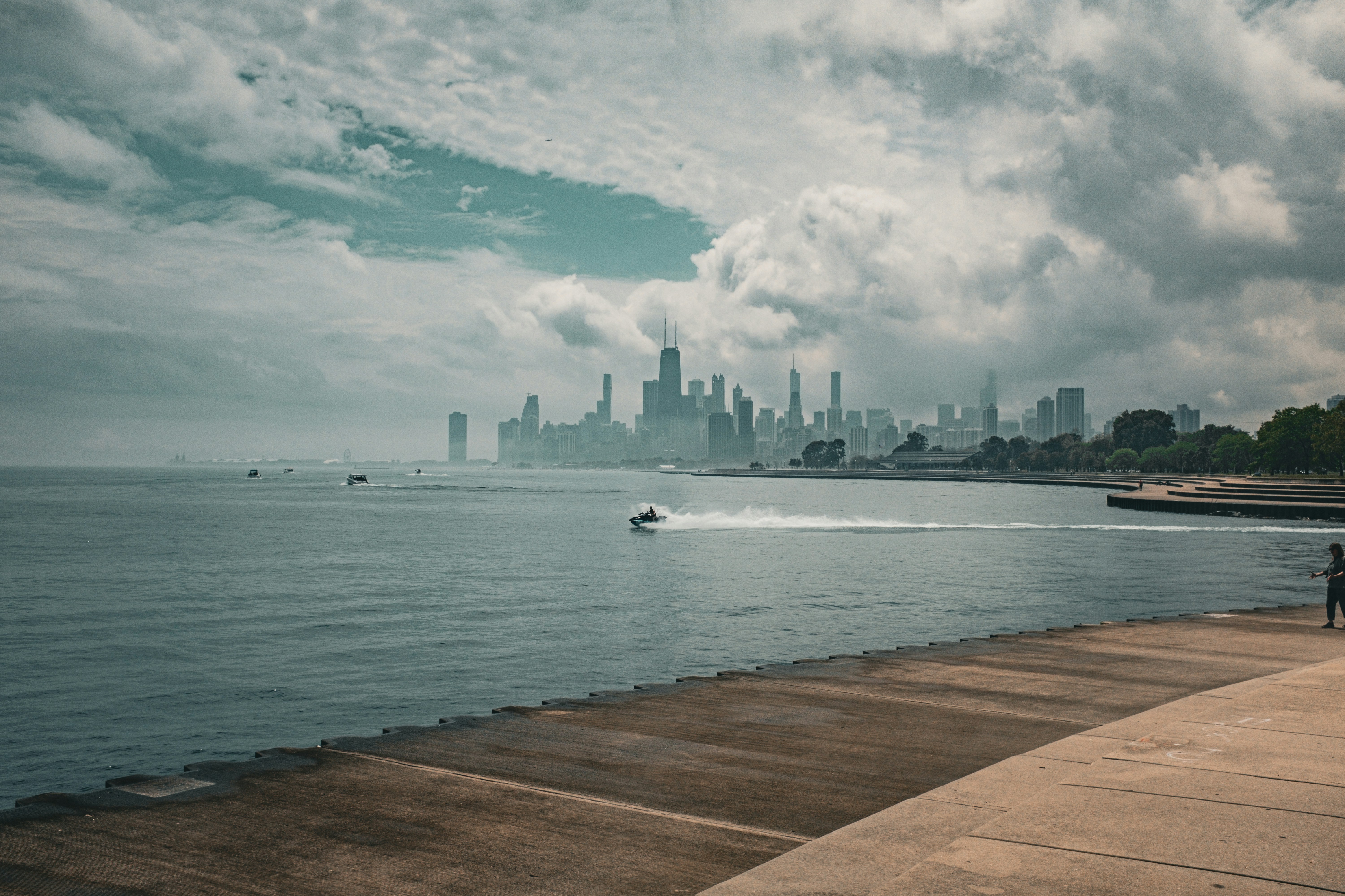 Harbor Promenade Toward a Distant Skyline