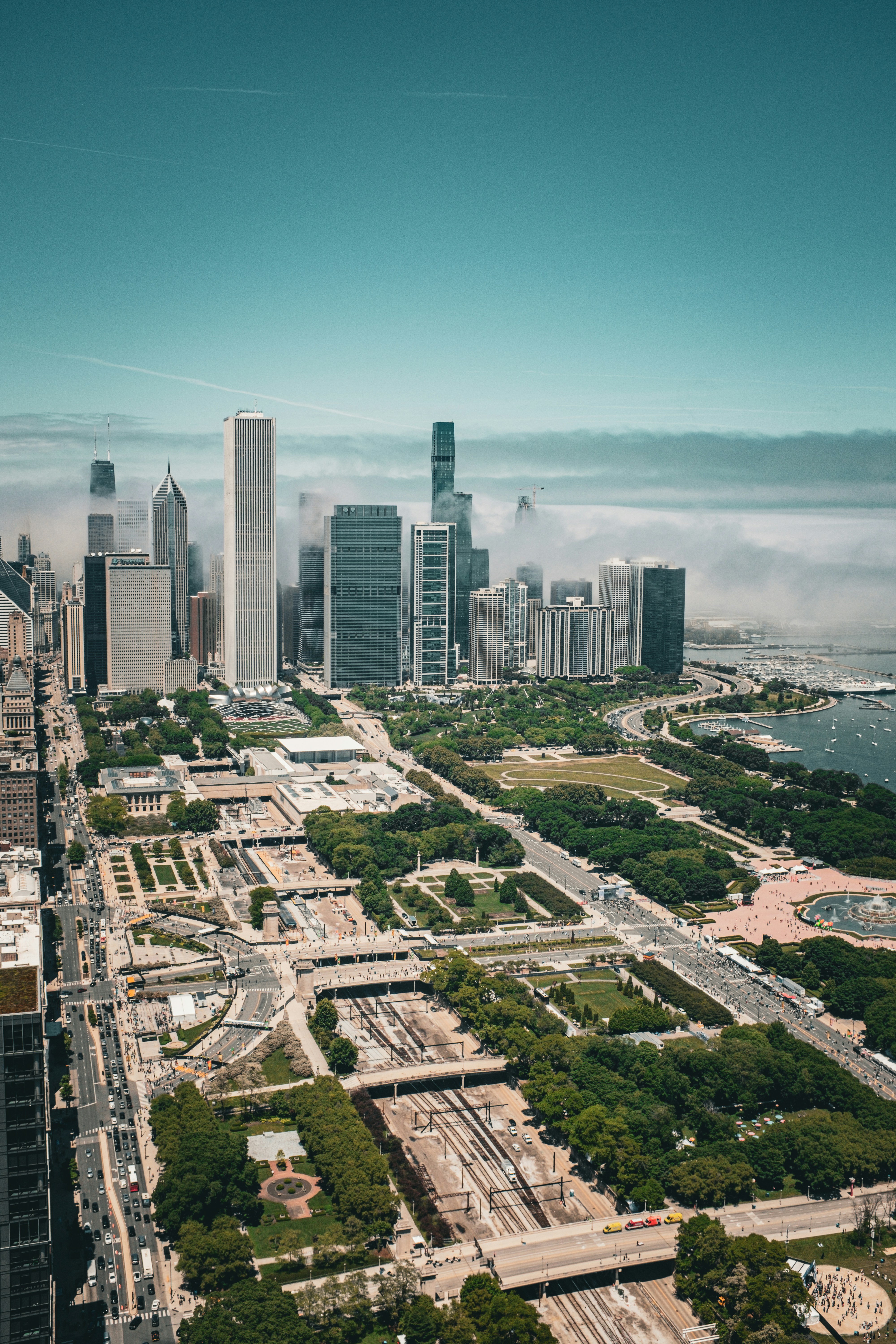 Skyline Over Green Grid: Aerial Cityscape of Chicago Near the River