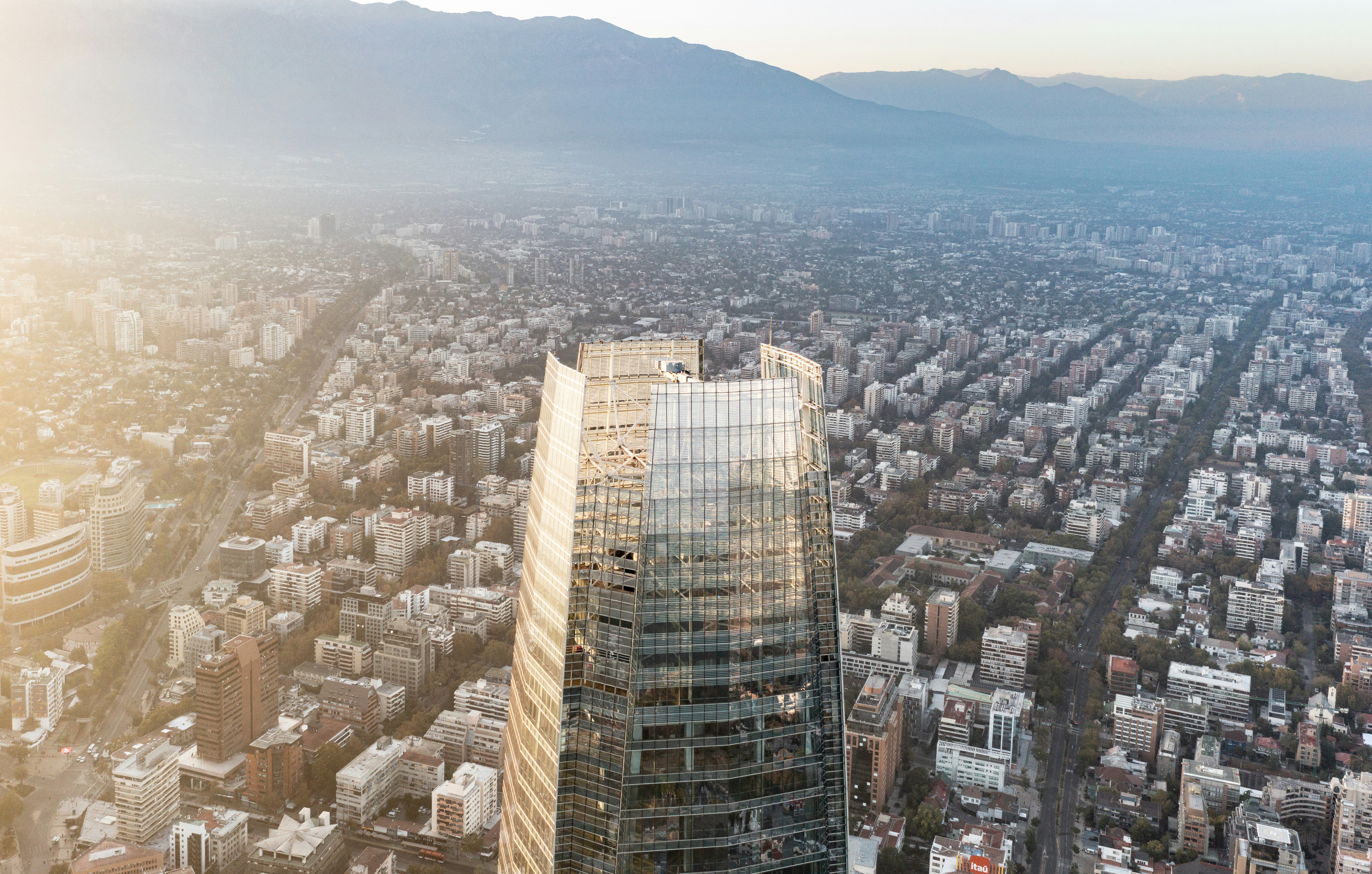 Aerial Glimpse of a Tower Framing a City Grid
