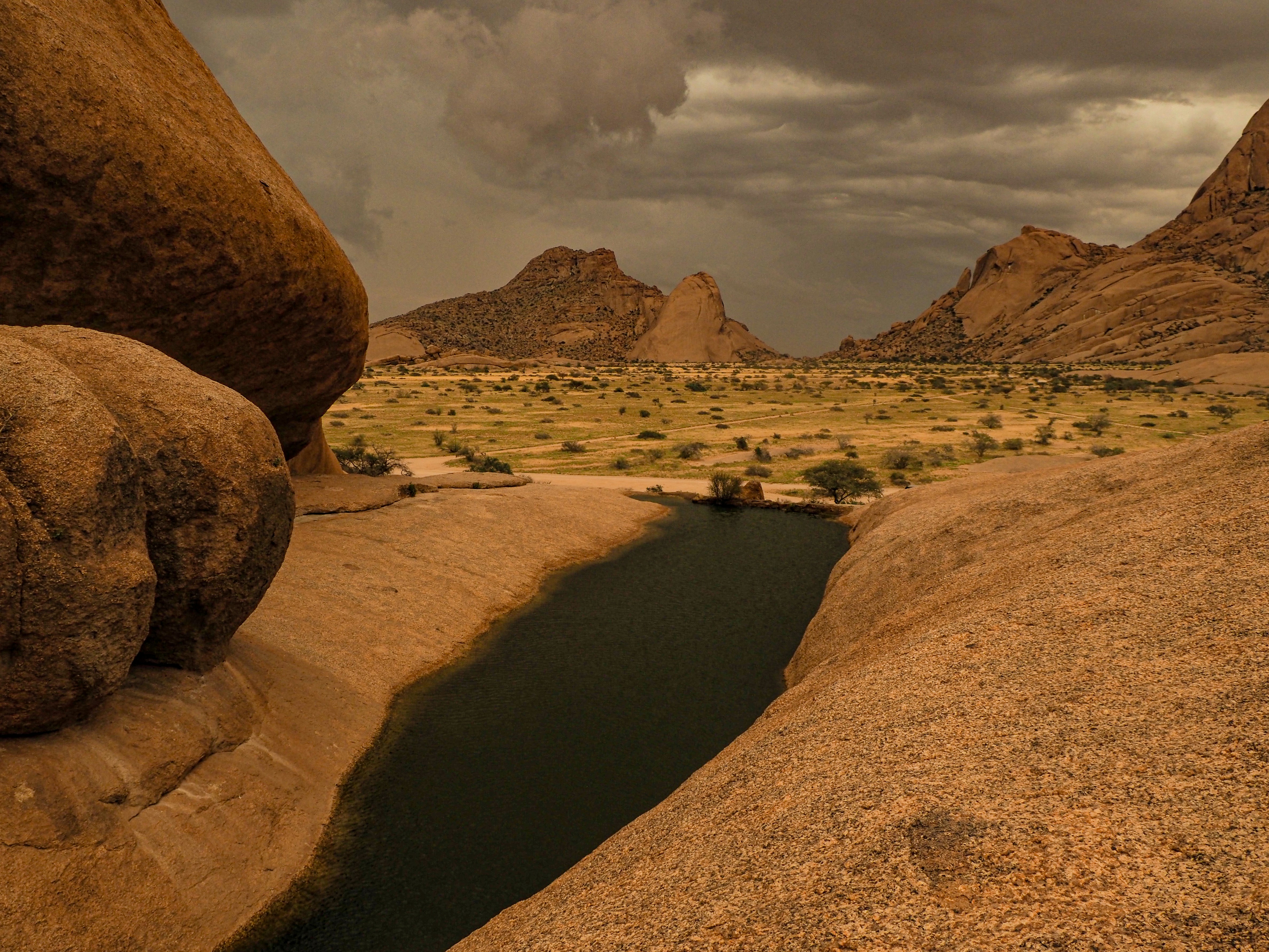Desert Rift: A Narrow Watercourse Winding Between Granite Giants