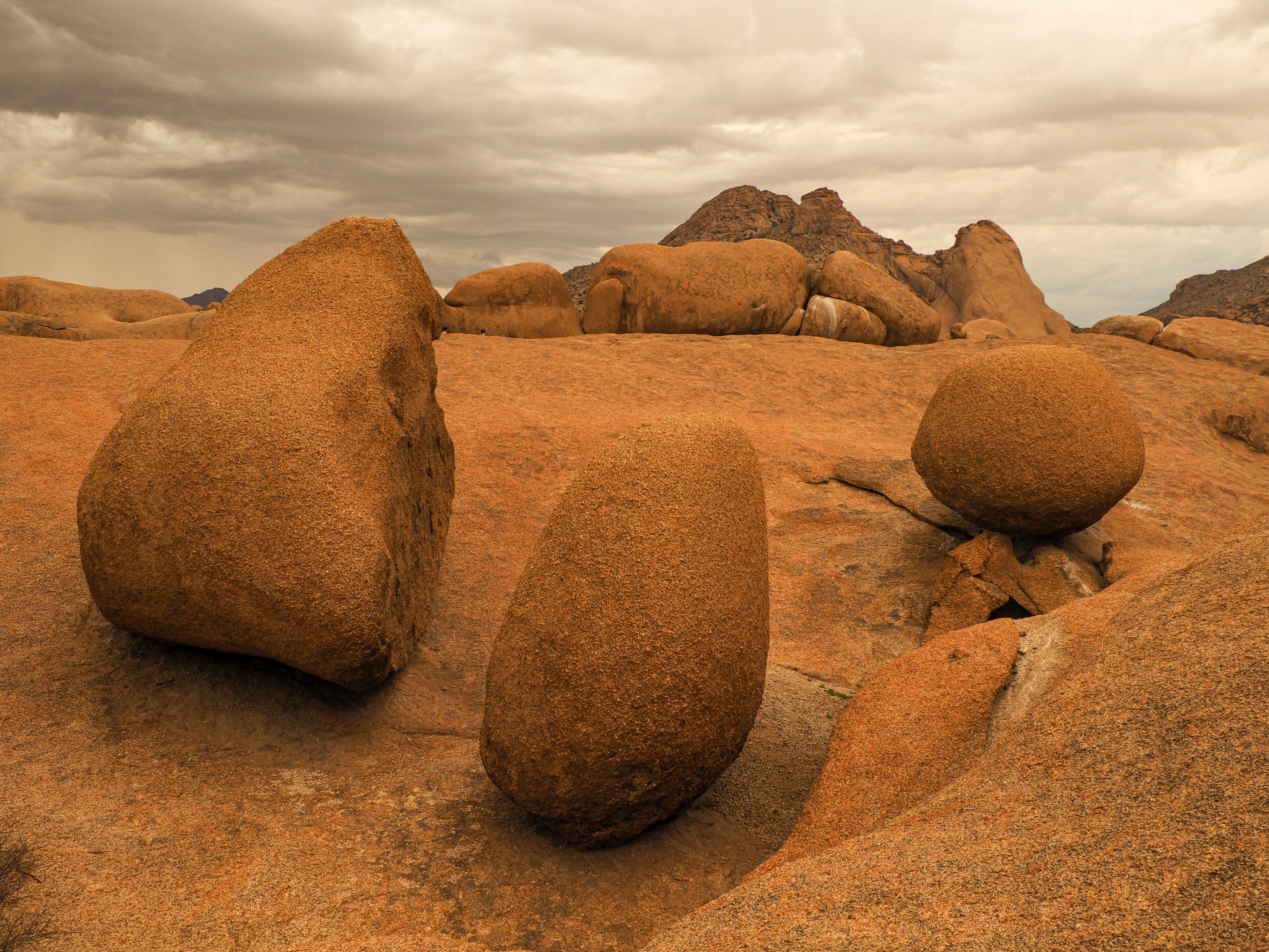 Balanced Boulders on a Slipstream Shore