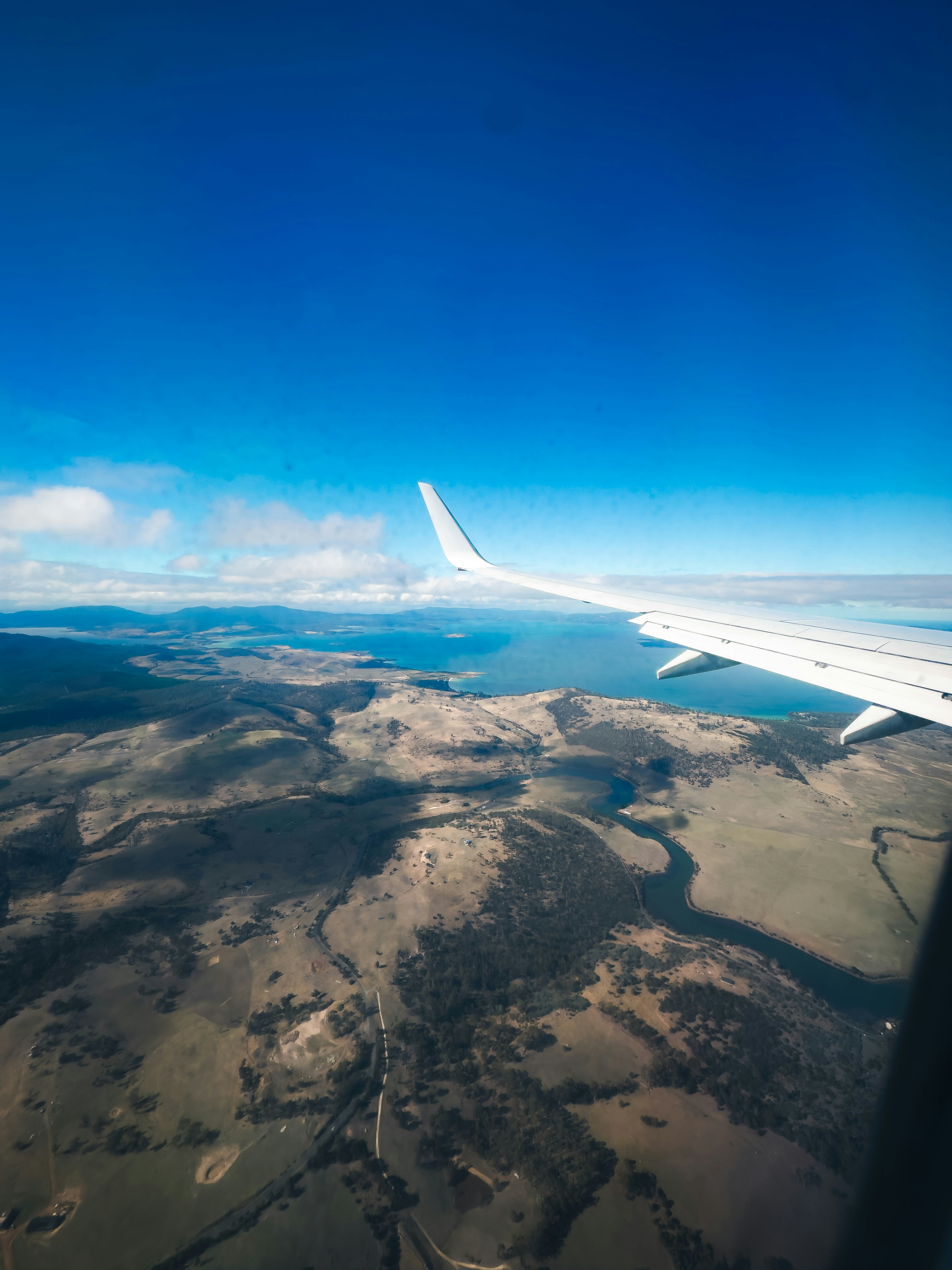 White Wingslice Over Rolling Terrain