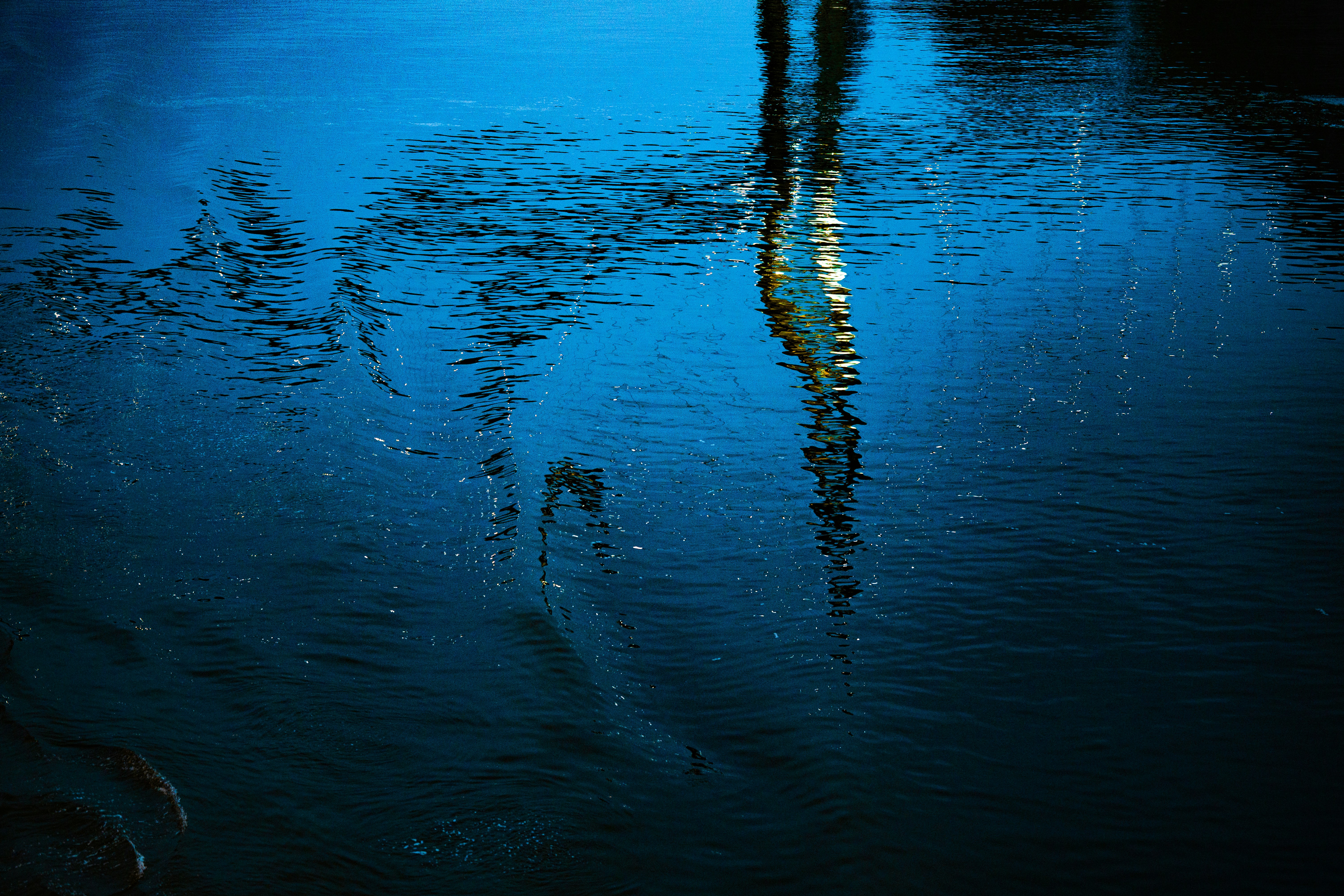 Reflections in a Quiet Blue Reservoir