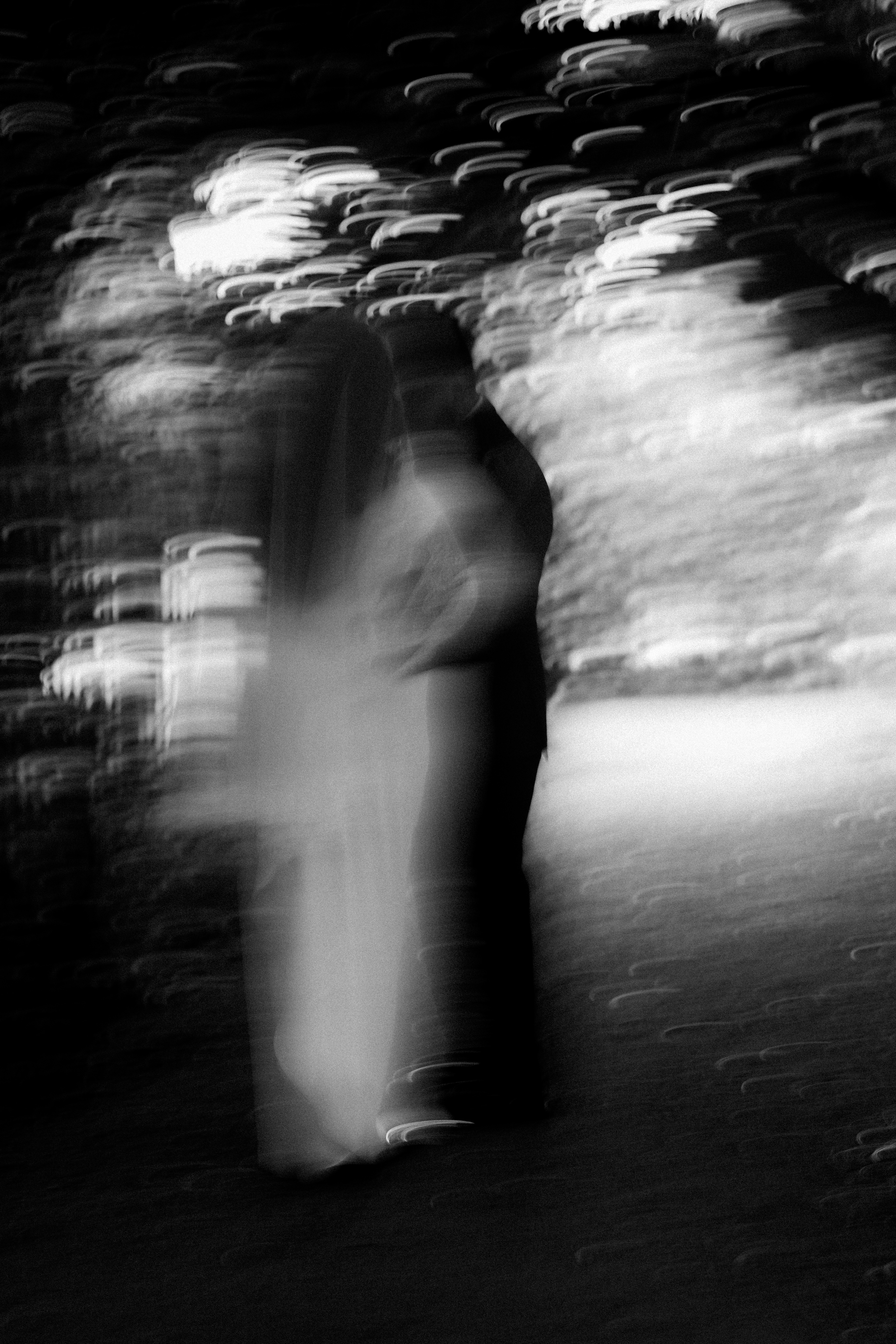 Echoes of a Moment: A Blurred Embrace in Night Lights