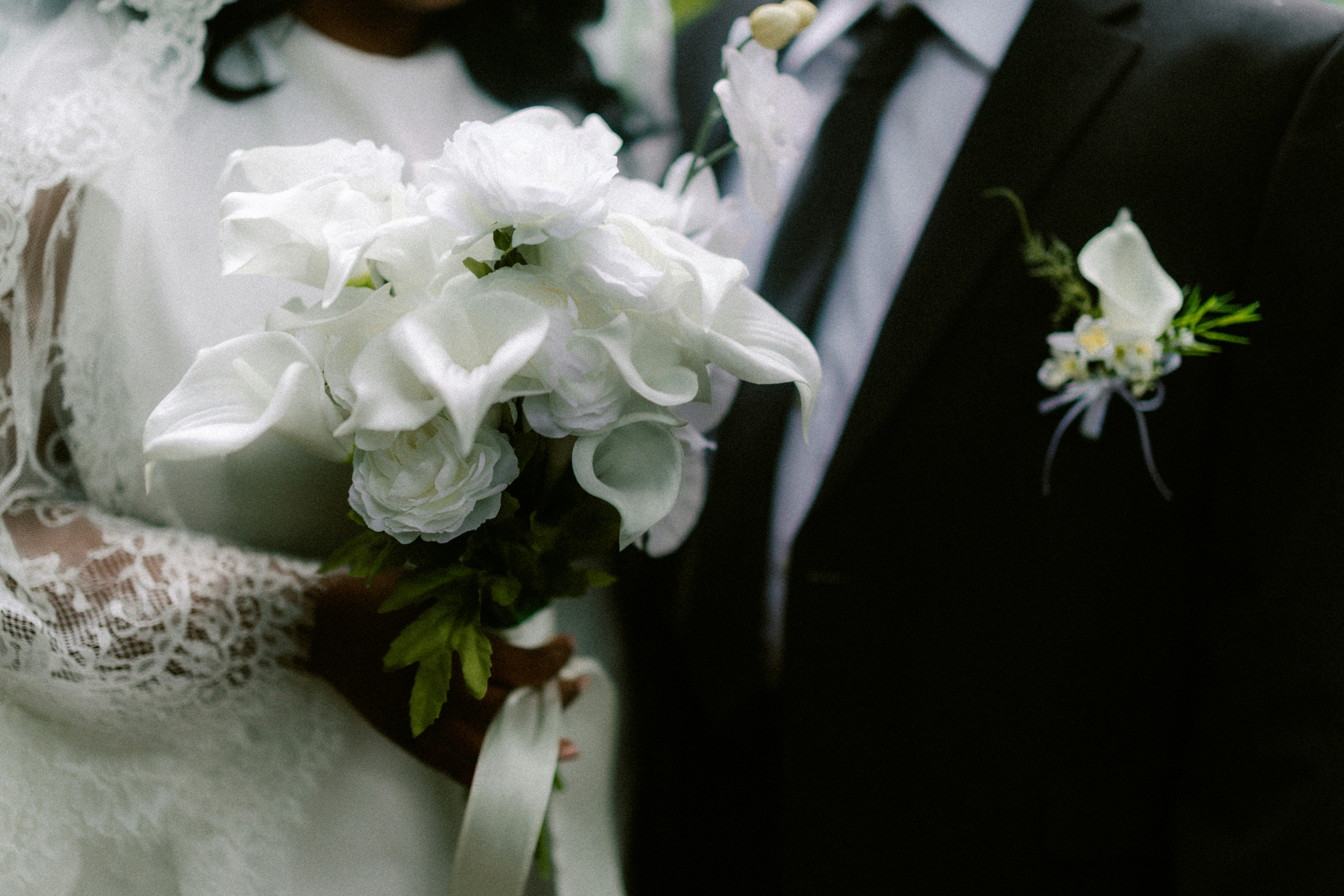 White Bouquet at the Edge: A Wedding Moment Between Promises