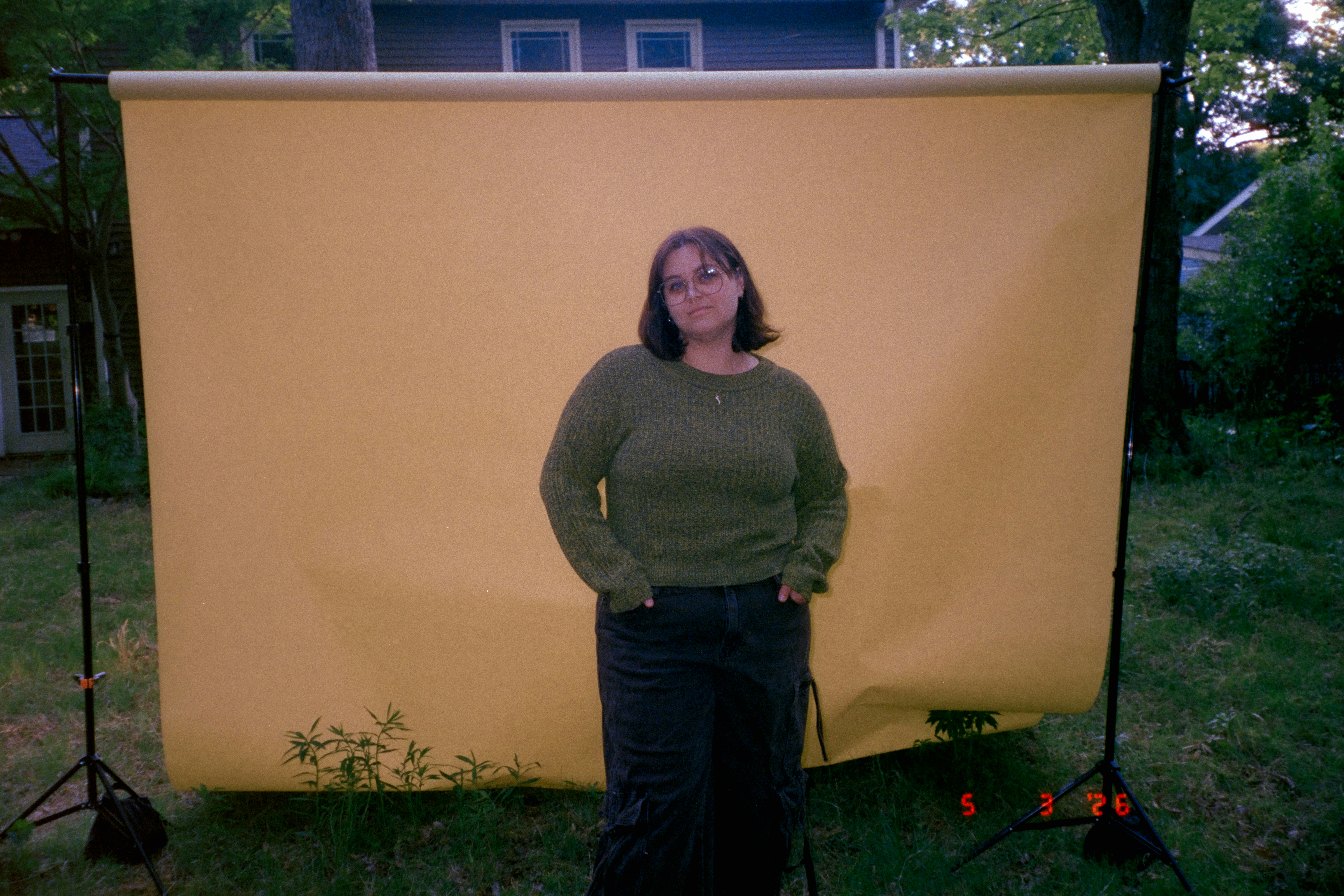 Portrait in Front of a Yellow Backdrop