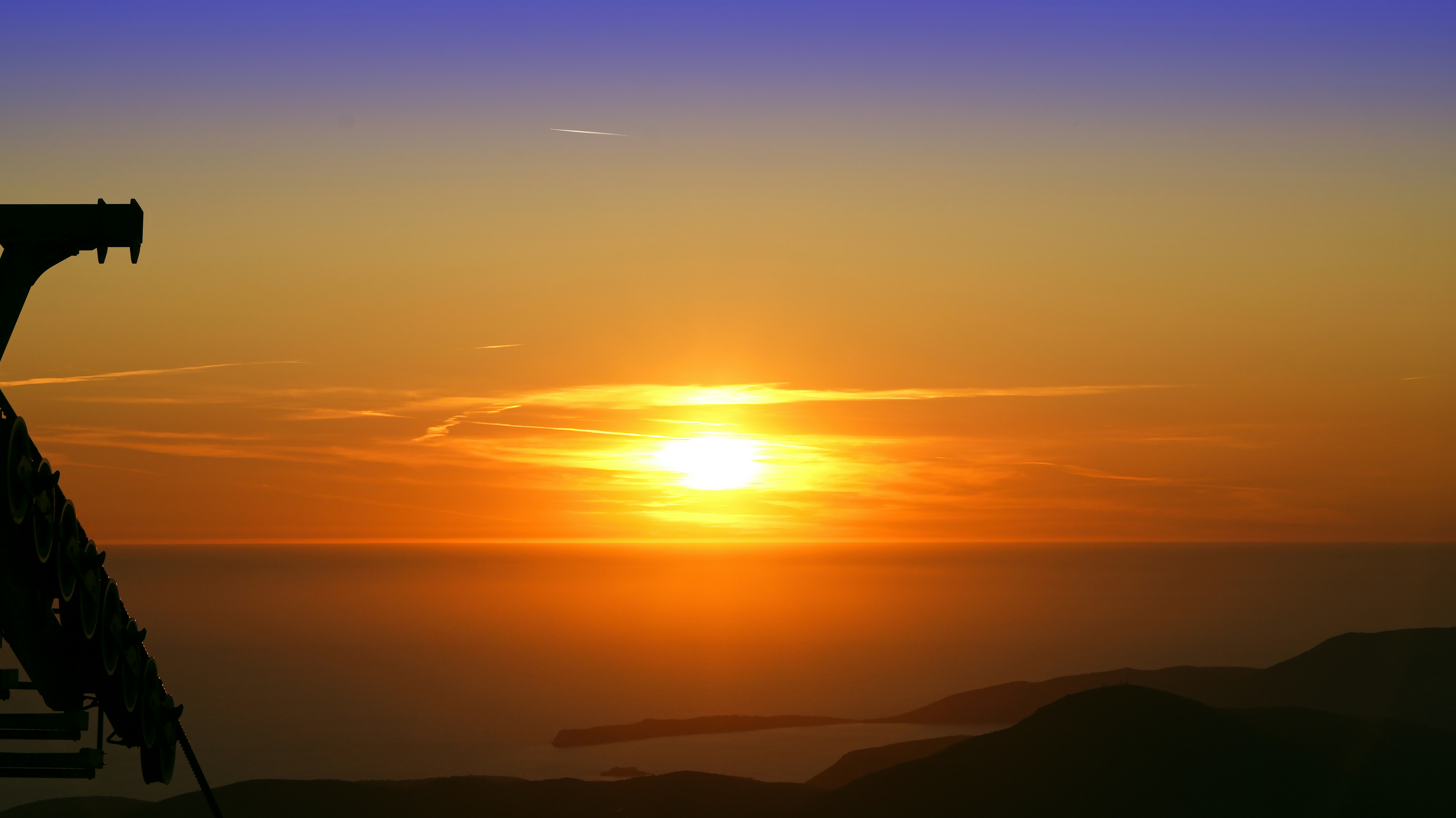 Sunset Over the Coastal Ridge from a Quiet Terrace