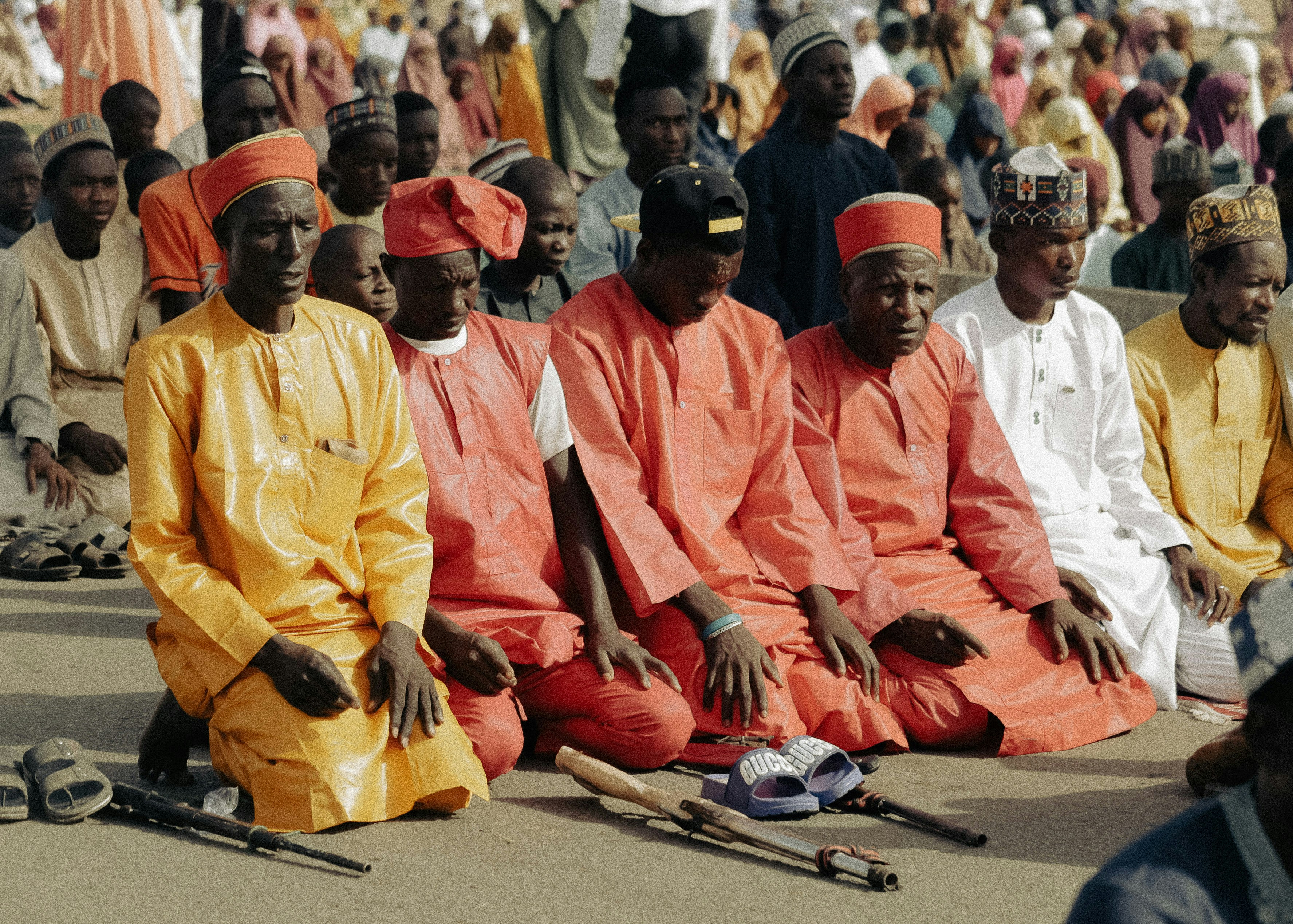 Multi-Colored Clergy in Prayer: A Moment of Silent Unity