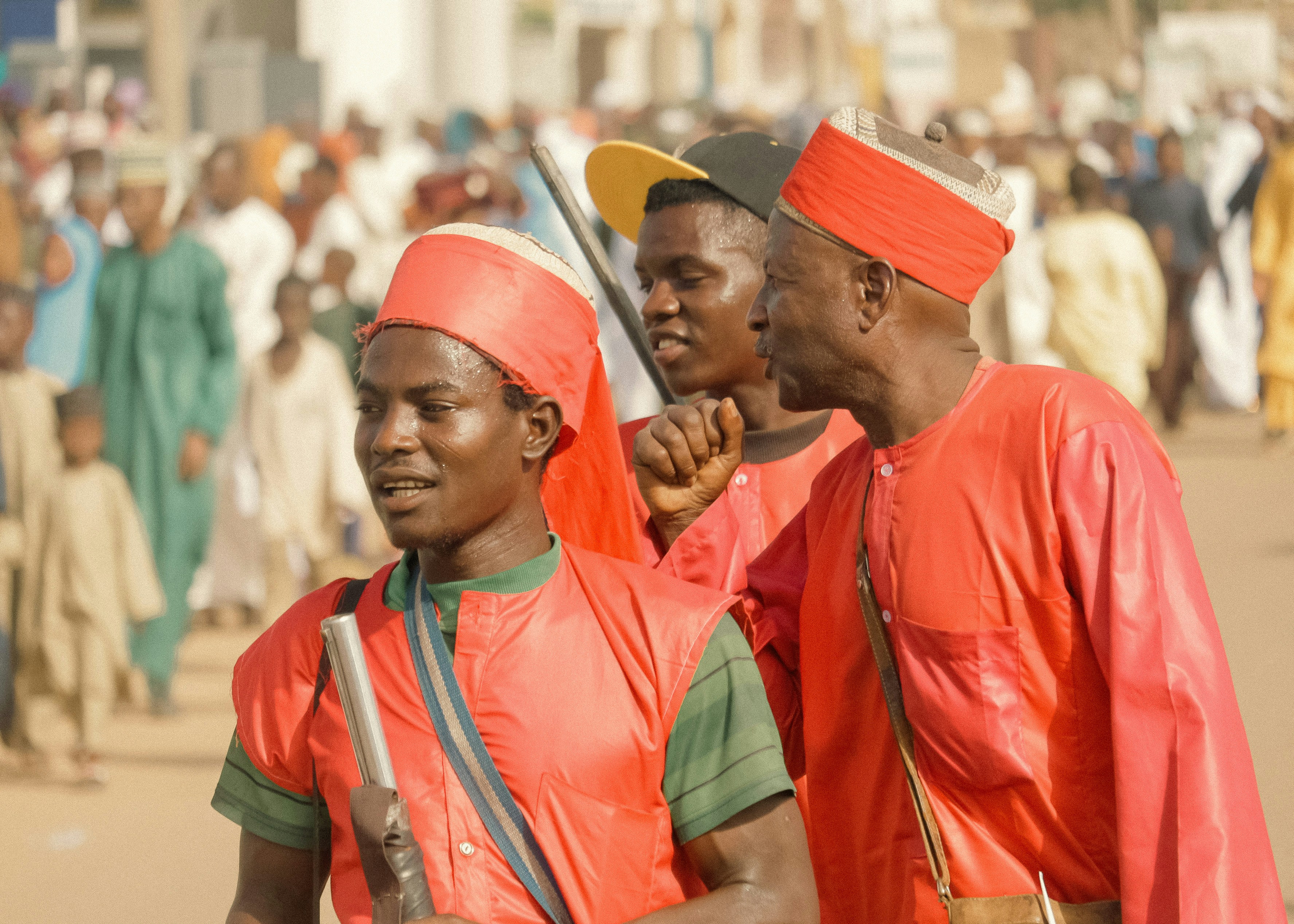 Red-clad Drum Beat: A Trio at Dusk in the Market Square