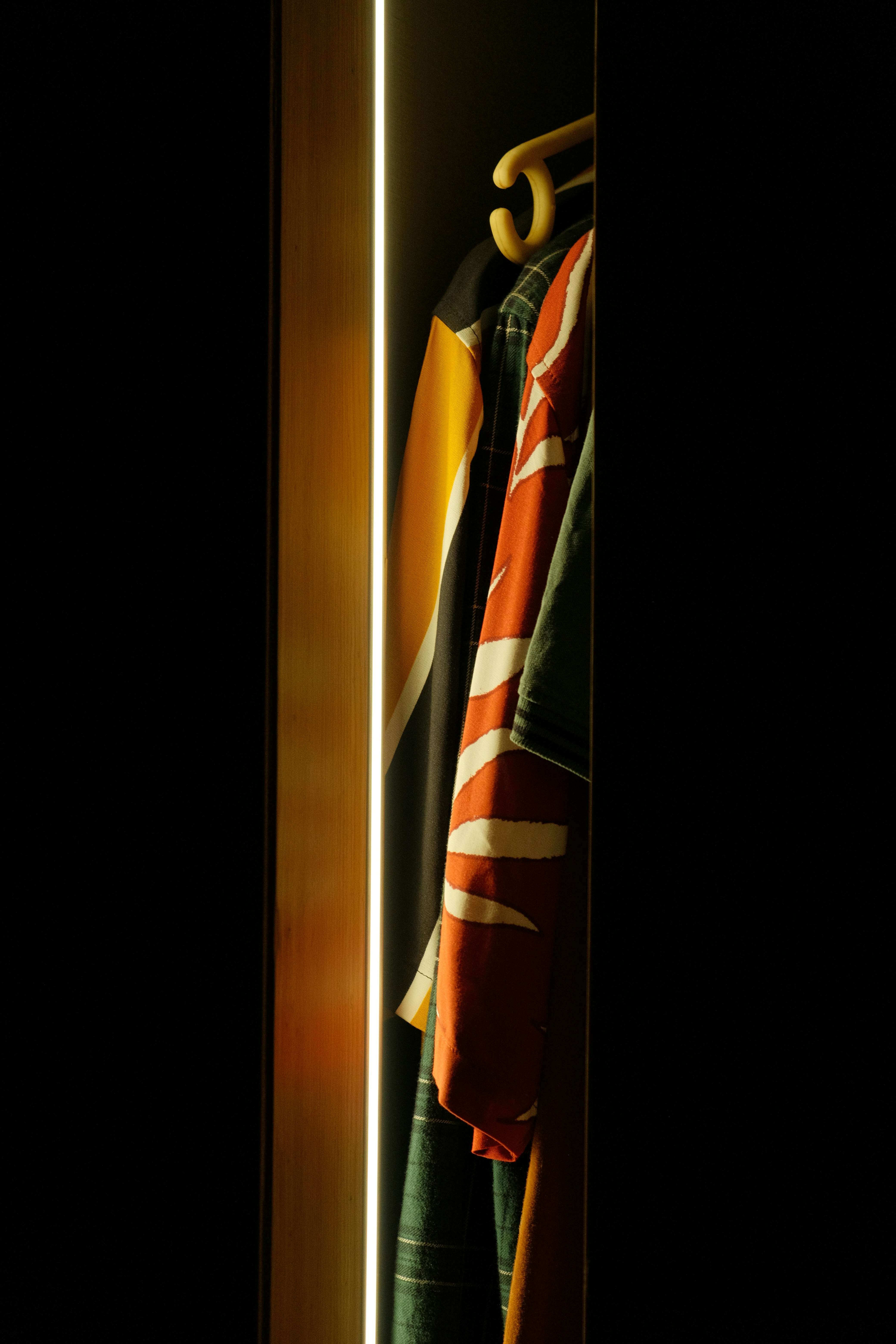 Neon seam: a vertical glimpse into a wardrobe of color