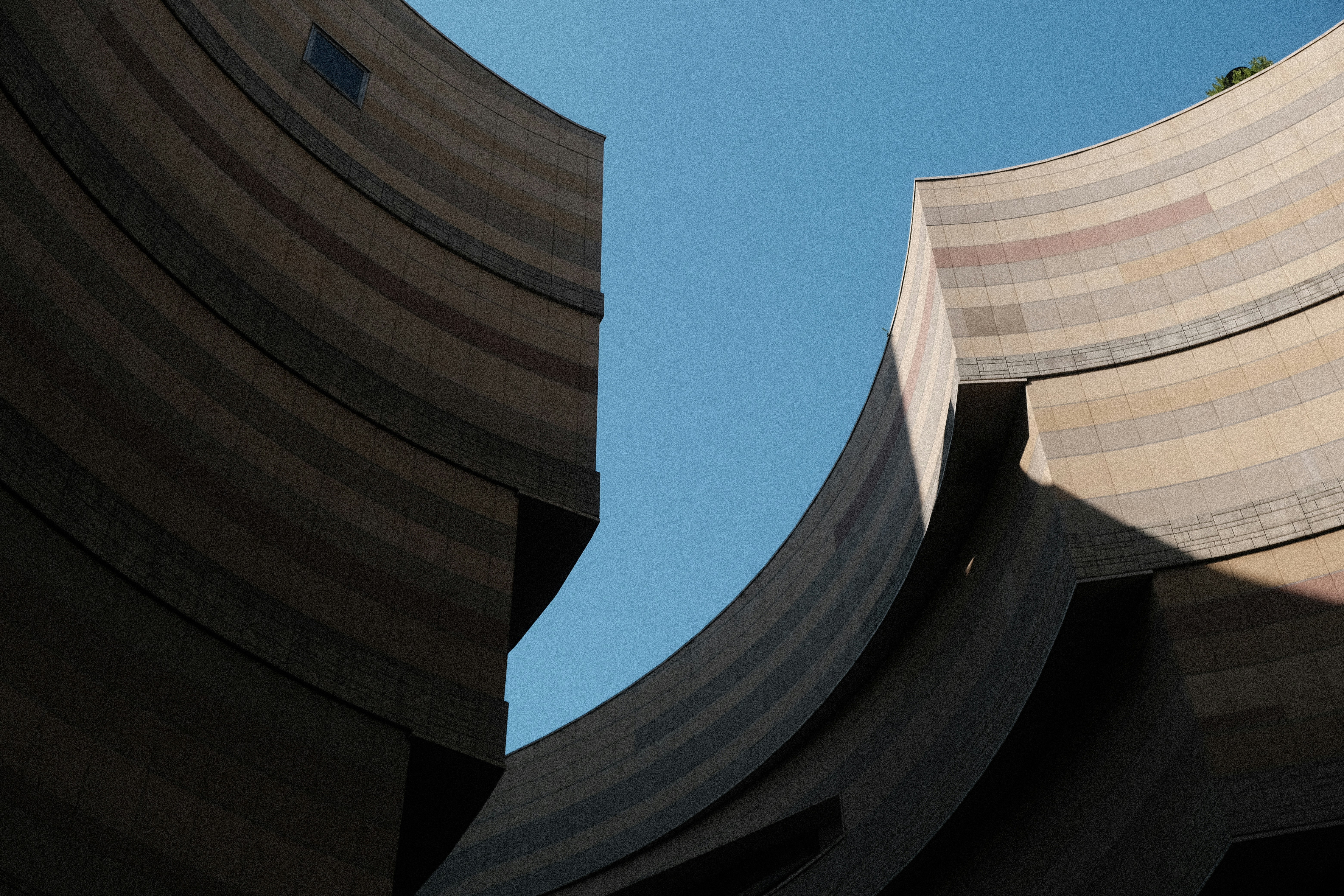 Blue Sky Between Curves: Architecture in Diagonal Light